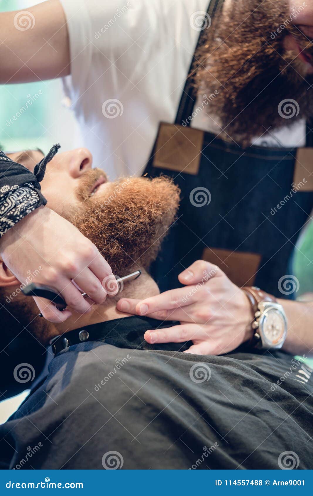 Close-up of the Hand of a Barber Using Scissors while Trimming Stock ...