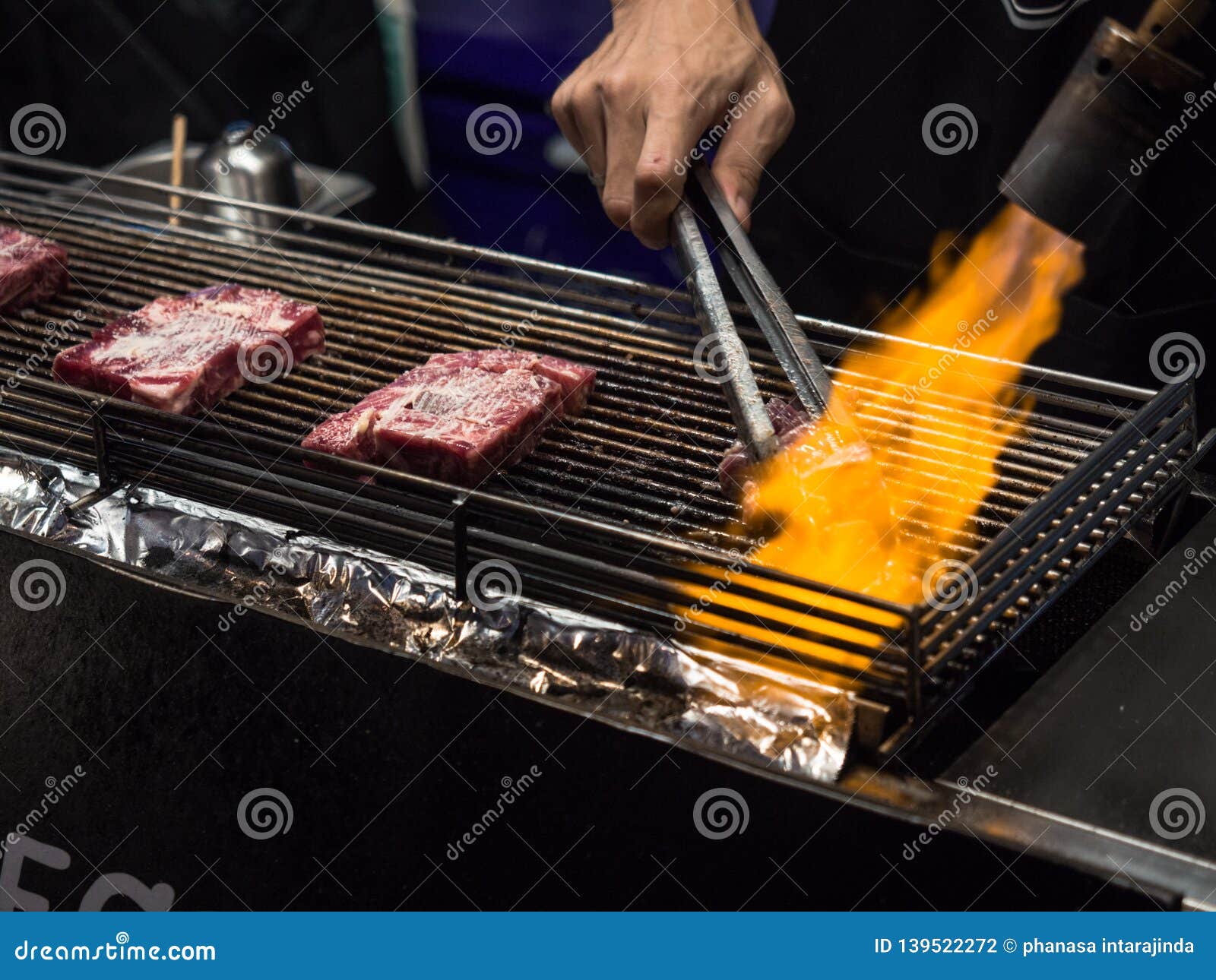 Close Up Hand of Chef Using Flame Torch Burn on Japanese Wagyu Beef ...