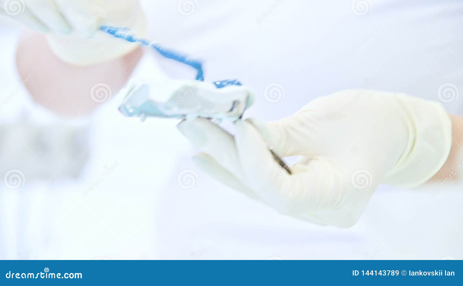 Close-up of the Hand of Dentistry Mix Components for a Composite ...
