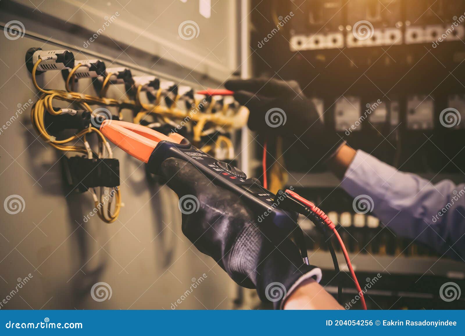 Close-up Hand of Electrical Engineer Using Measuring Equipment To ...