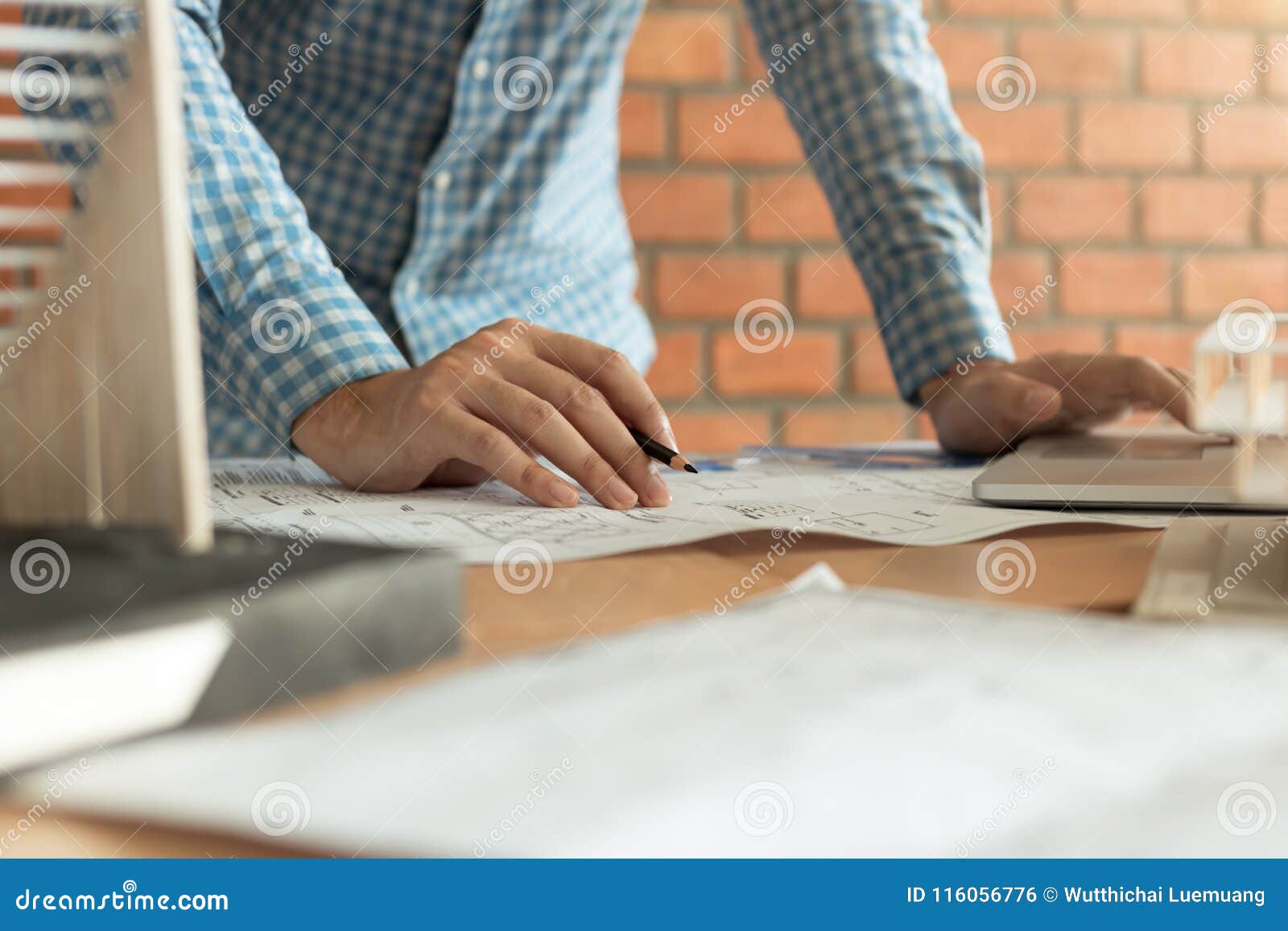 Close Up Hand Engineering Man Standing Examining Working on Blue Stock ...