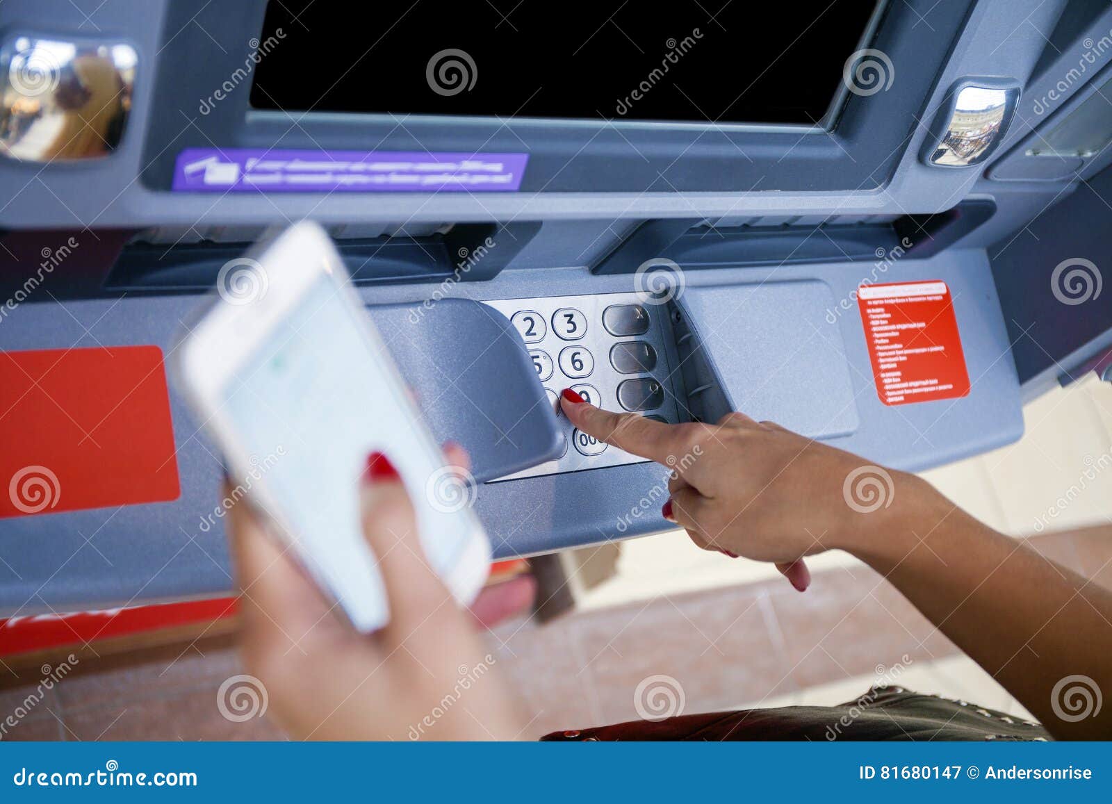 Close Up of Hand Entering Pin at an ATM. Finger about To Press a Stock ...