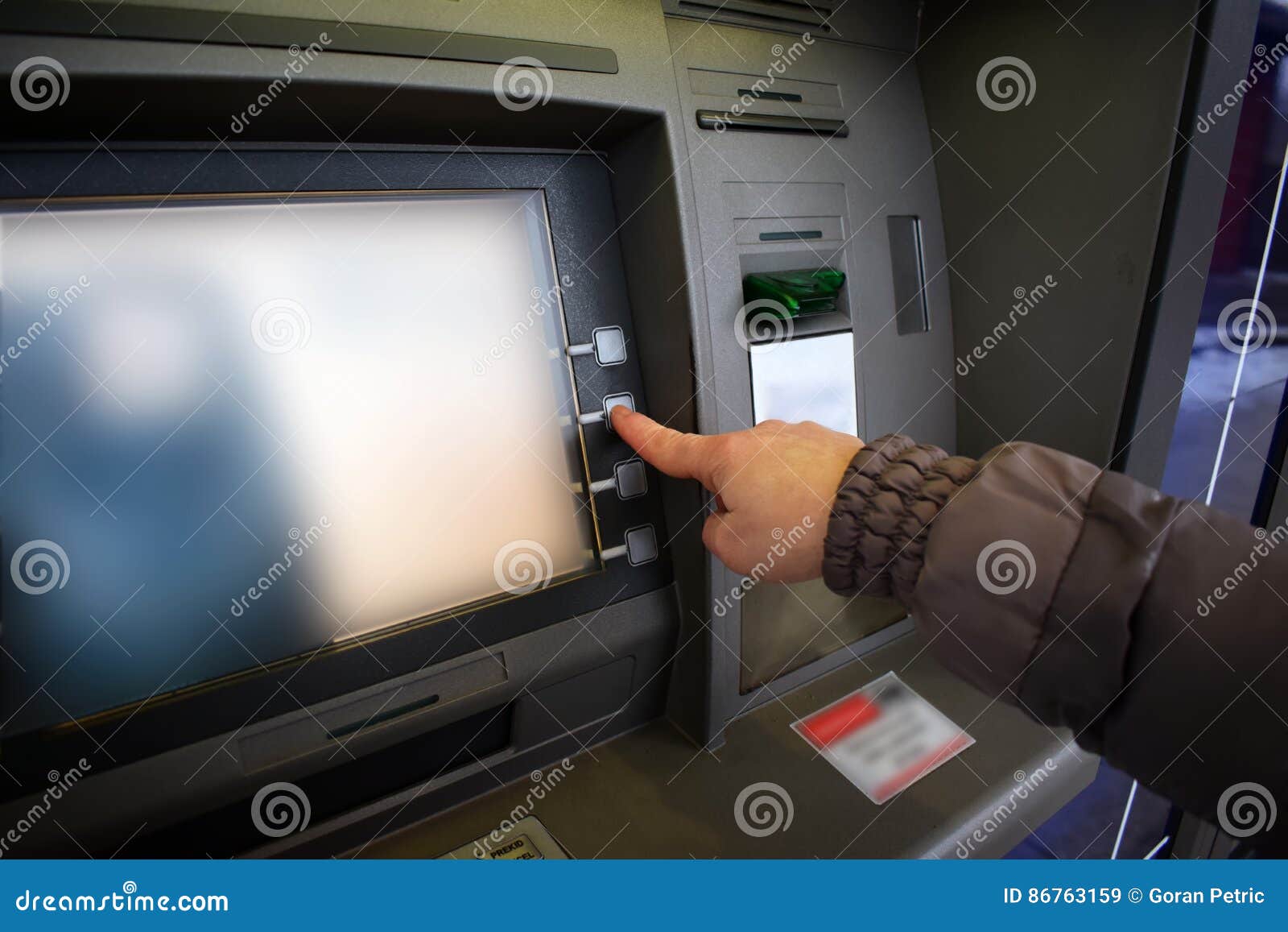 Close Up of Hand Entering Pin at an ATM. Woman Using Banking Machine ...