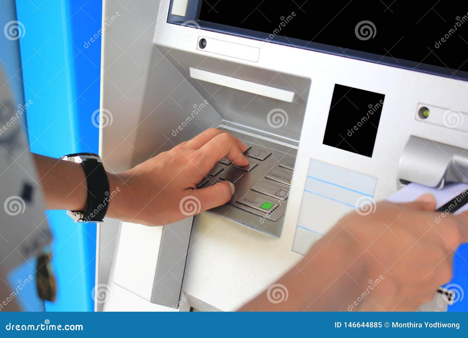 Close-up of Hand Entering PIN Numbers with Credit Card on ATM Bank ... Close-up of Hand Entering PIN Numbers with Credit Card on ATM Bank ...