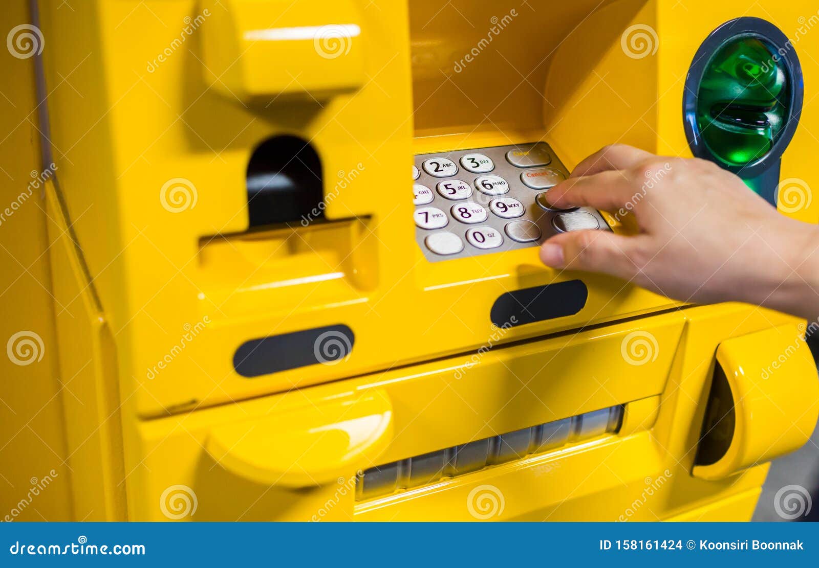 Finger about To Press a Pin Code on a Pad. Security Code on an Yellow ...