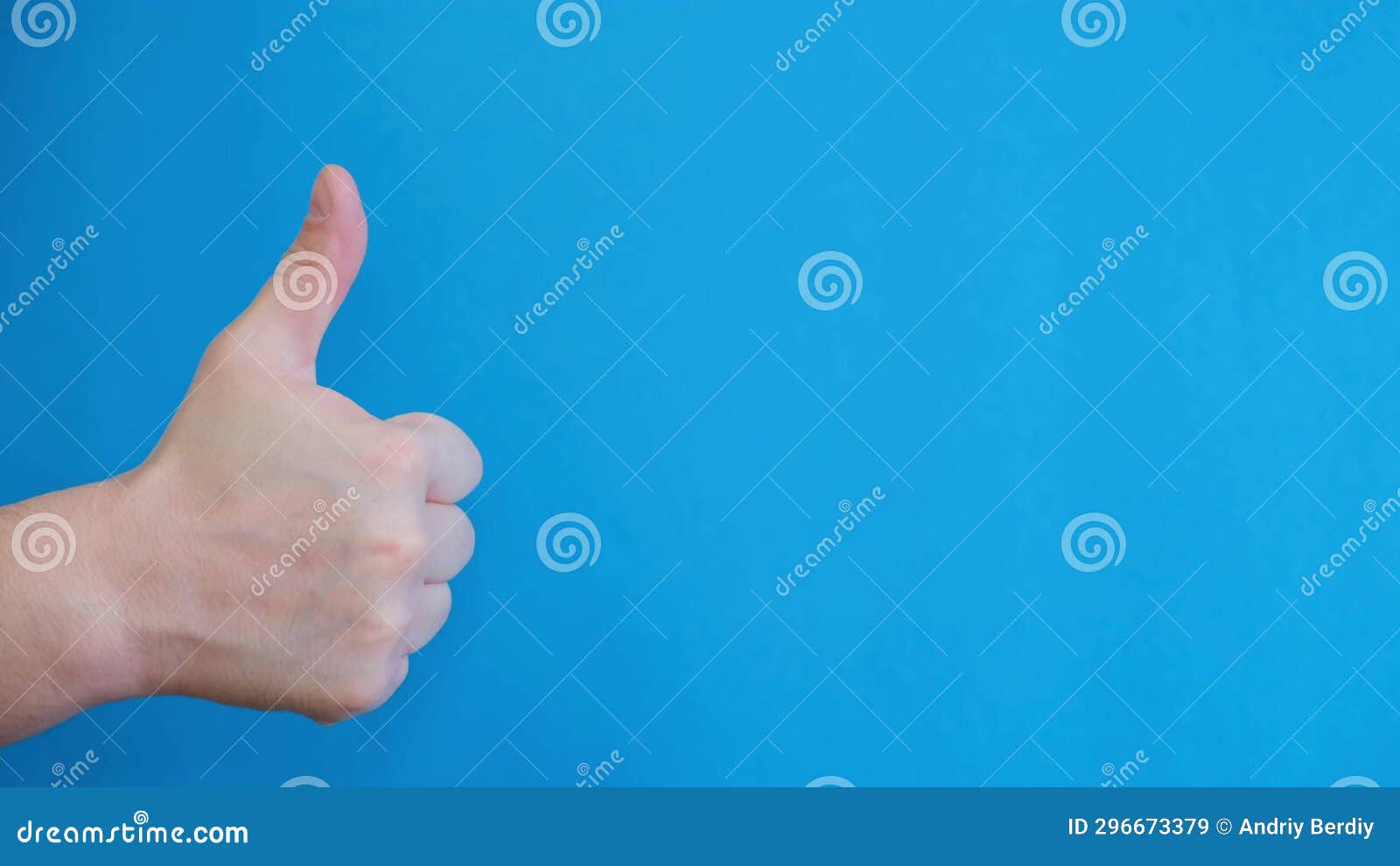 Close-up Hand Gesture Thumb Up on Blue Background Stock Image - Image ...