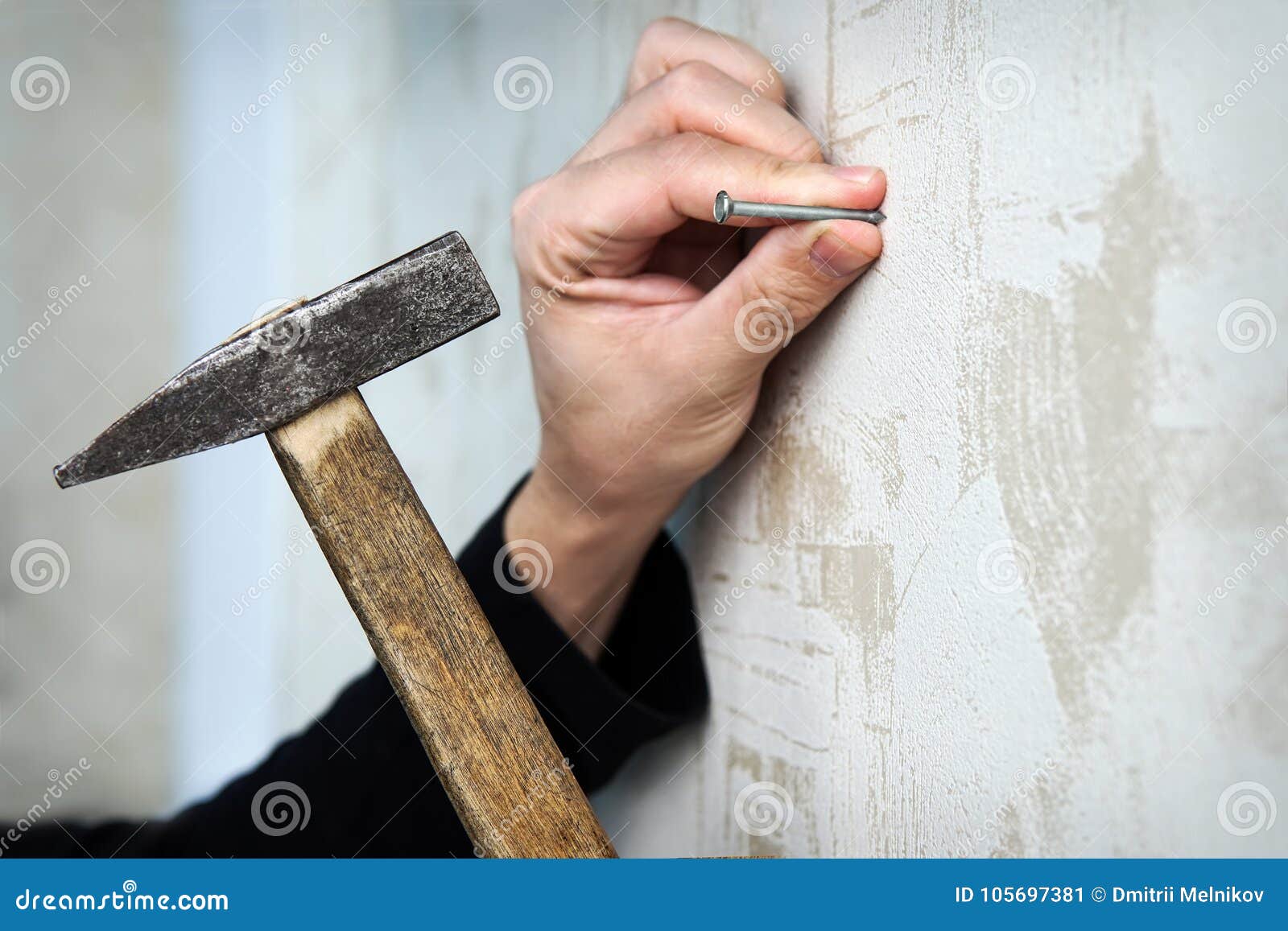 Close Up on a Hand Hammering a Nail on a Wall Stock Image - Image of ... Close Up on a Hand Hammering a Nail on a Wall Stock Image - Image of ...