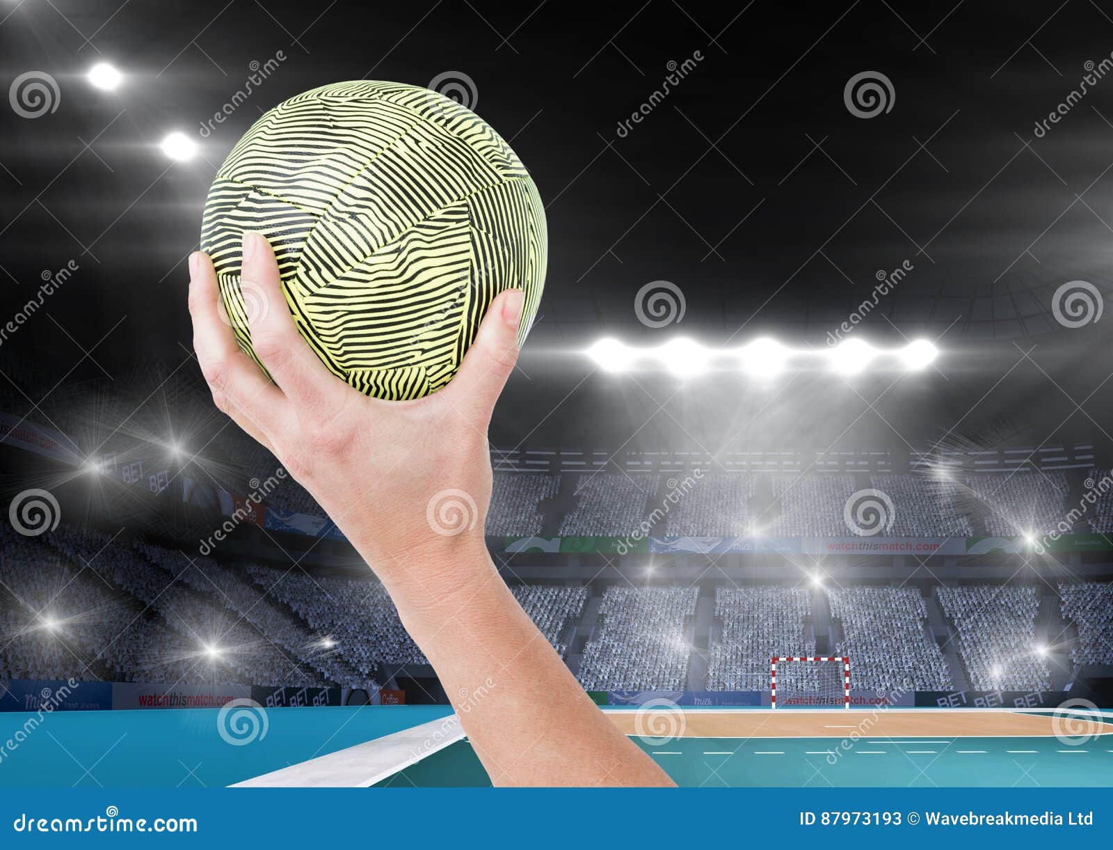 Close-up of Hand Holding Ball and Stadium in Background Stock Image ...