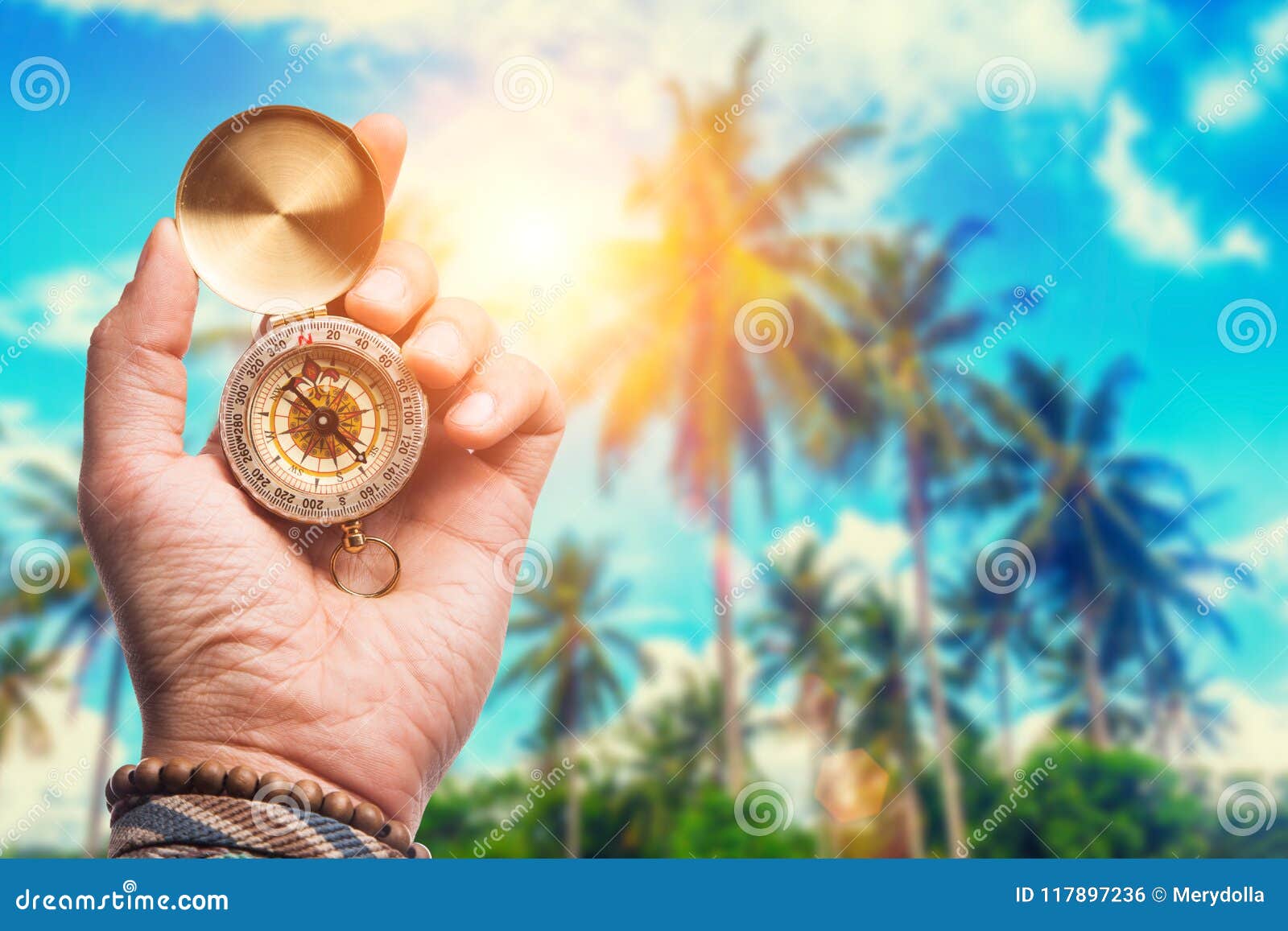 Hand holding compass stock photo. Image of people, hand - 117897236