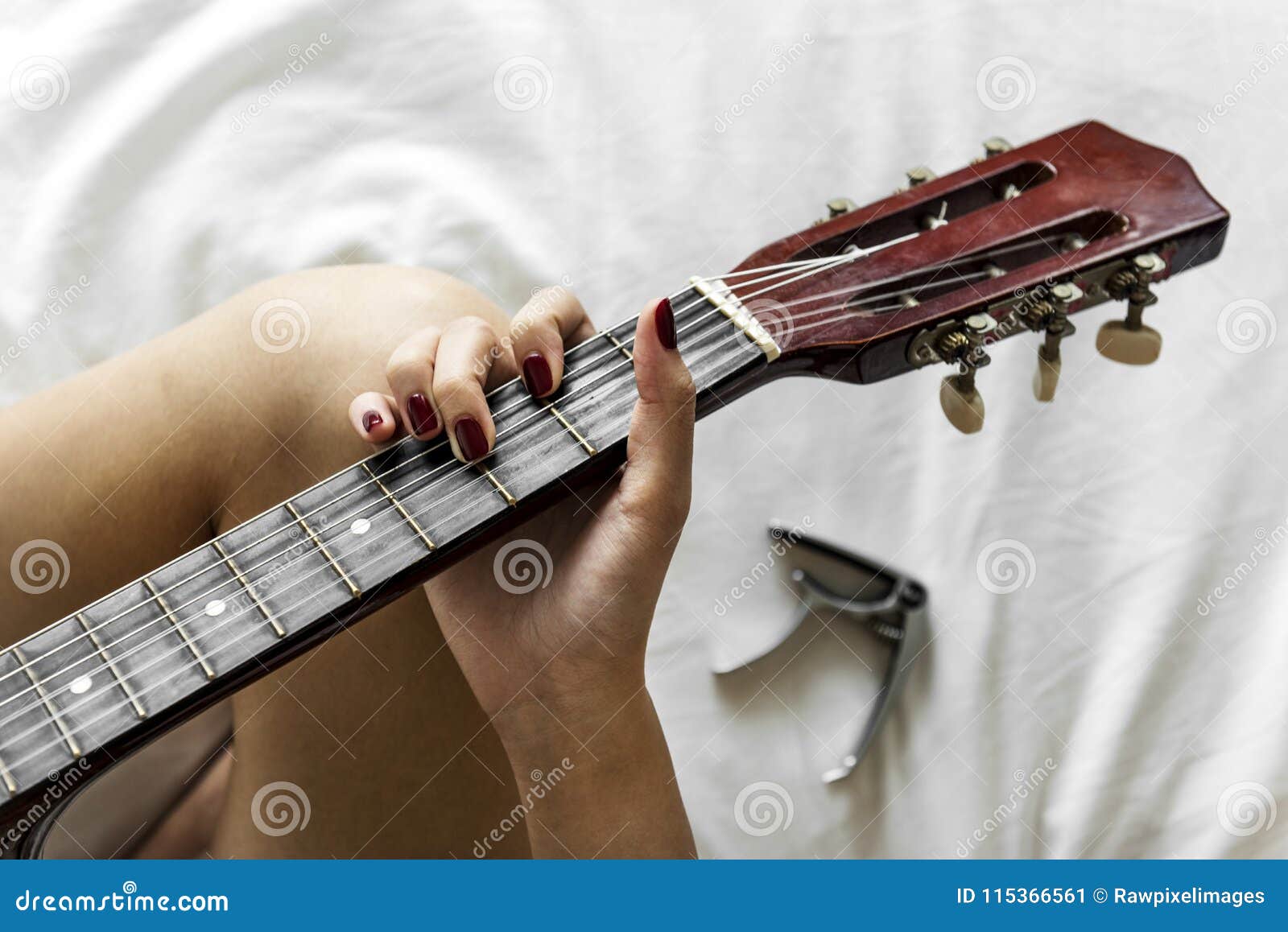 Close Up of a Hand Holding Guitar Stock Image - Image of leisure ...