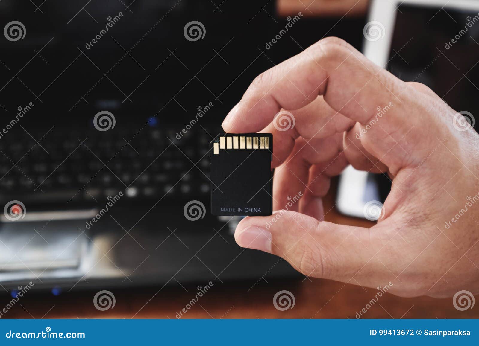 Close-up Hand Holding Memory Card, Made in China Technology Product ...