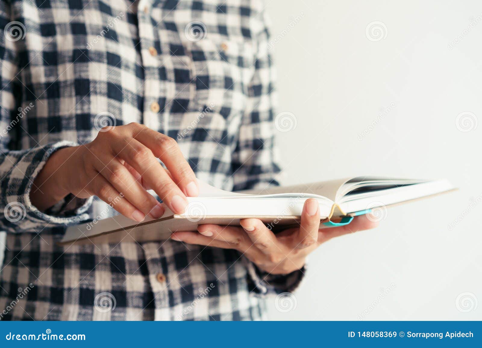 Close Up Hand Holding , Open and Reading a Book. Study is a Learning ...