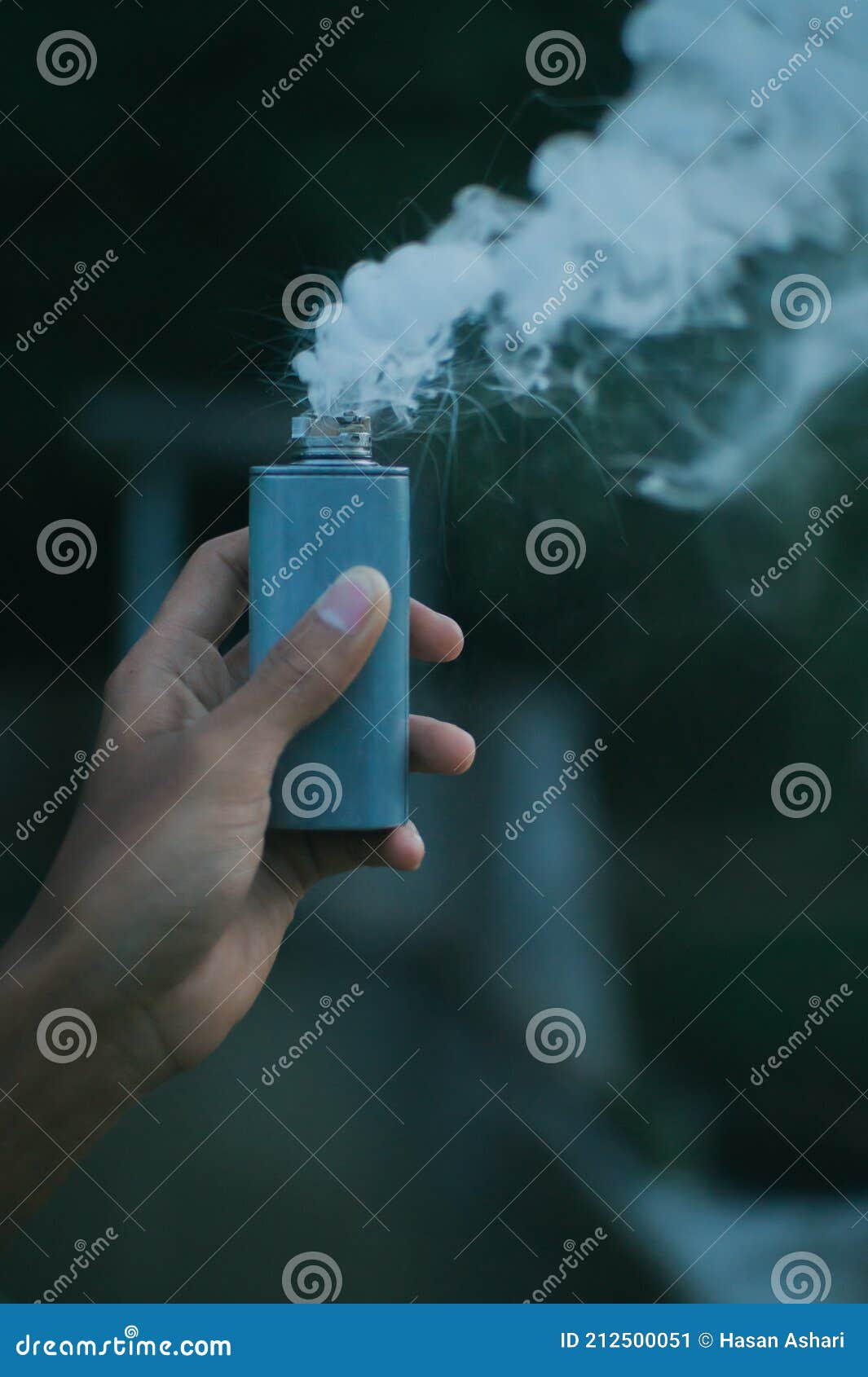 Close-Up Hand is Holding a Vape that is Emitting Smoke Stock Image ...