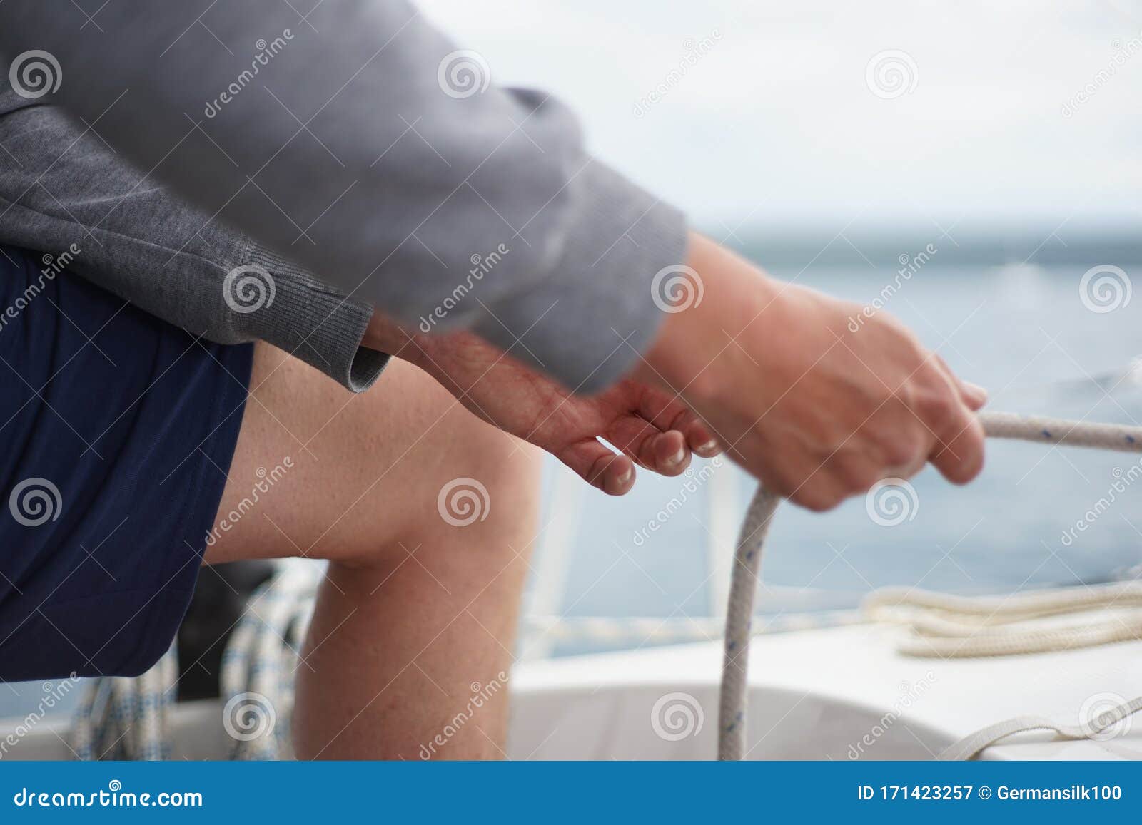 Close Up of a Hand Holding a Rope, Sheet on a Sailboat Stock Image ...