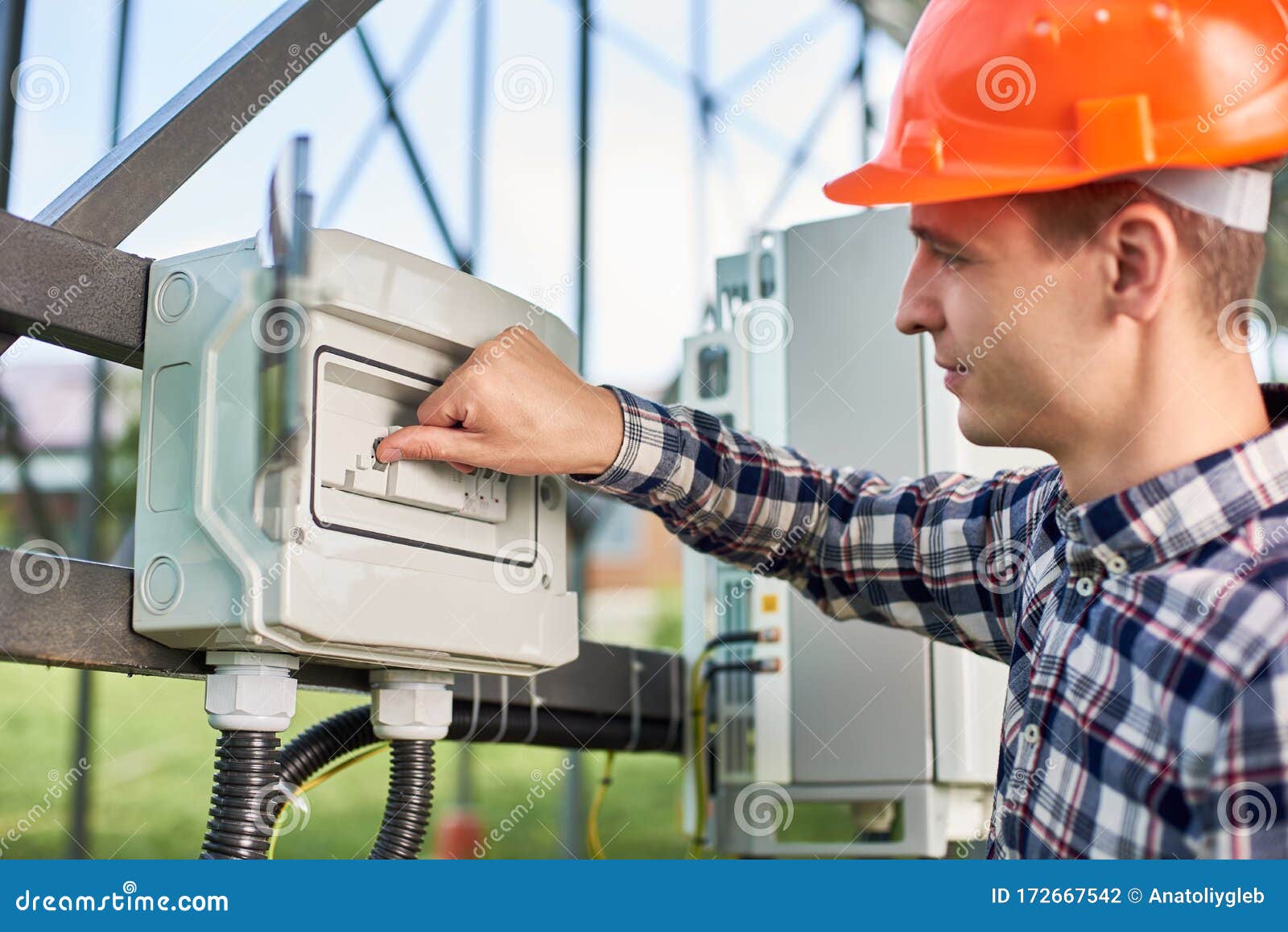 Close Up of Hand Man Pushing Button at the Electrical Equipment on ...
