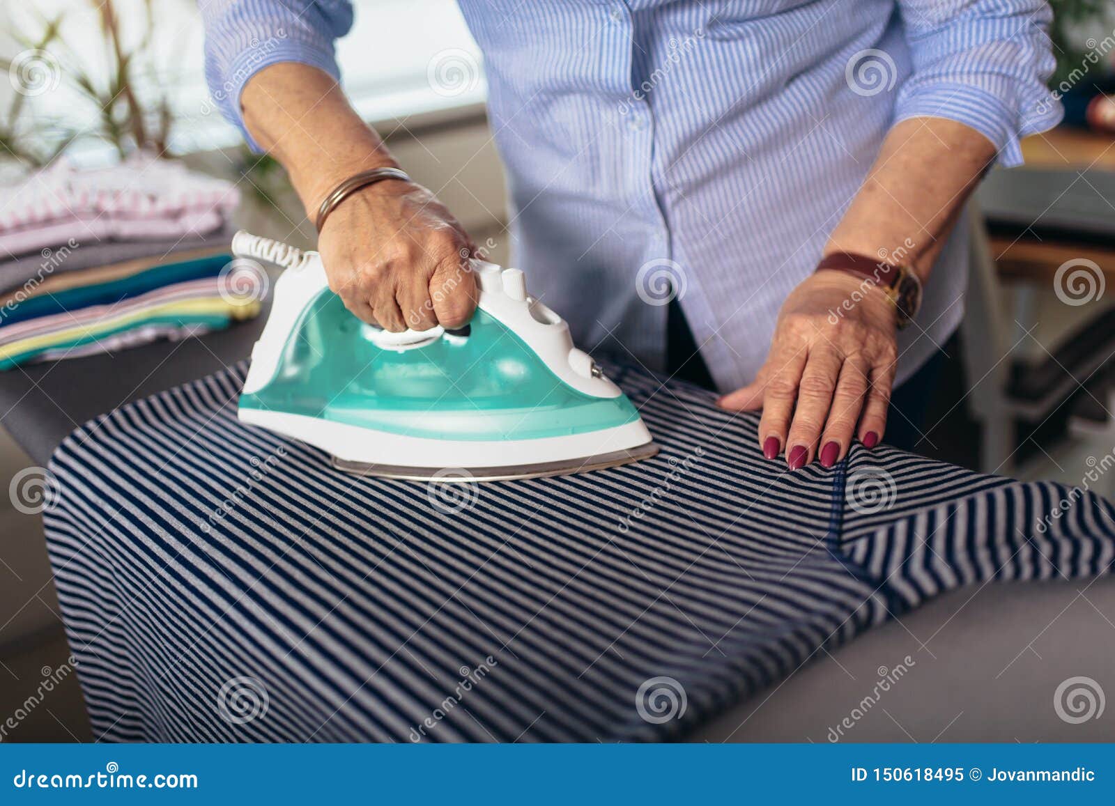 Close Up Hand Older Woman Ironing Stock Image - Image of ironing, hand ...