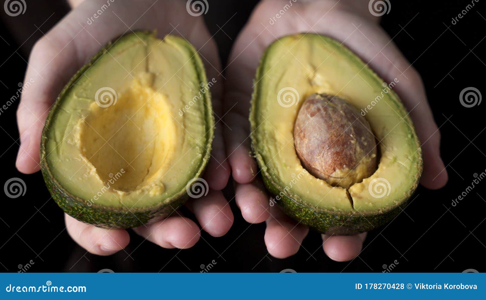 Close Up Hand Open Avocado Fruit Stock Photo - Image of green, cookery ...