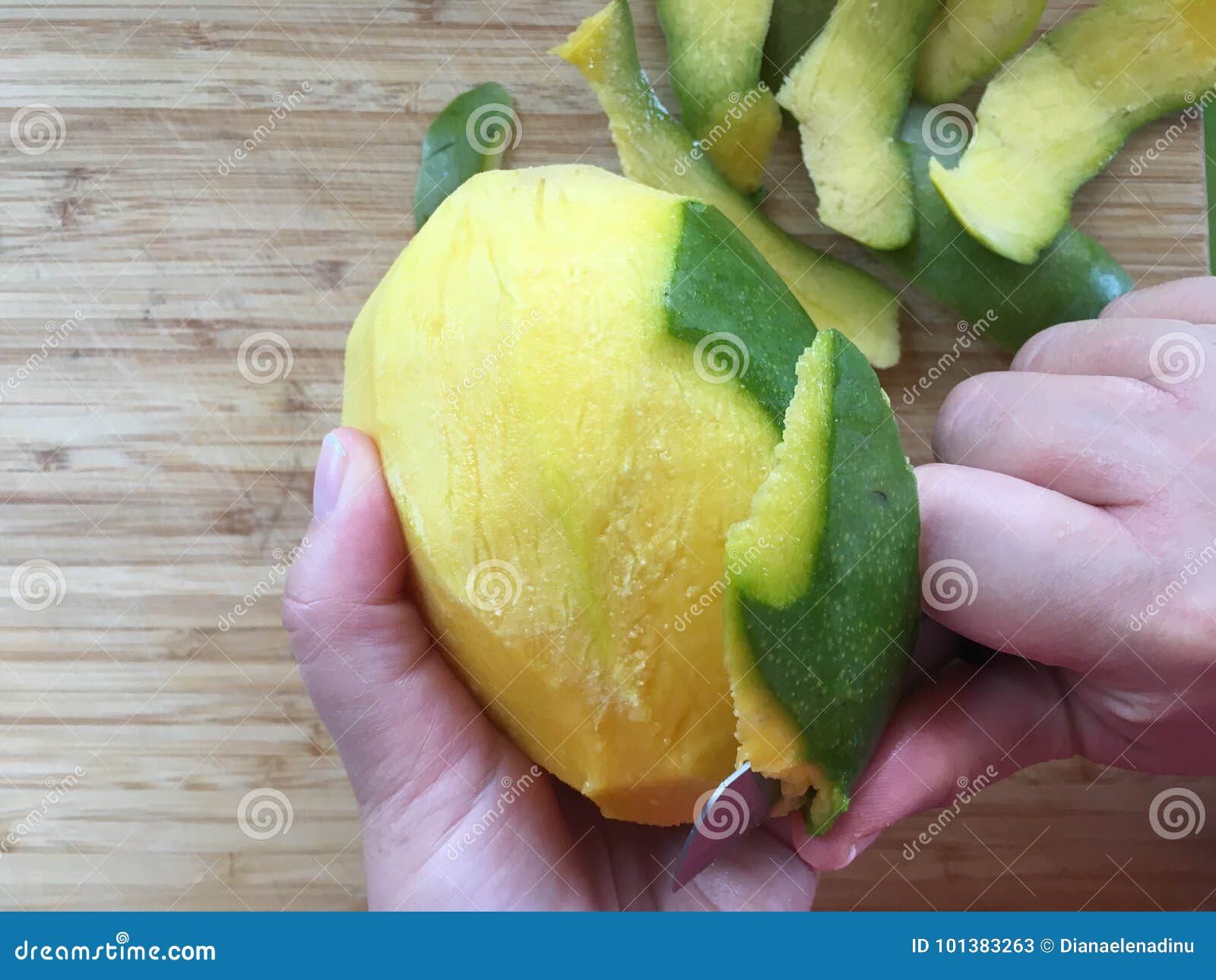 Close-up of Hand Peeling a Mango Fruit Stock Image - Image of sharp ...