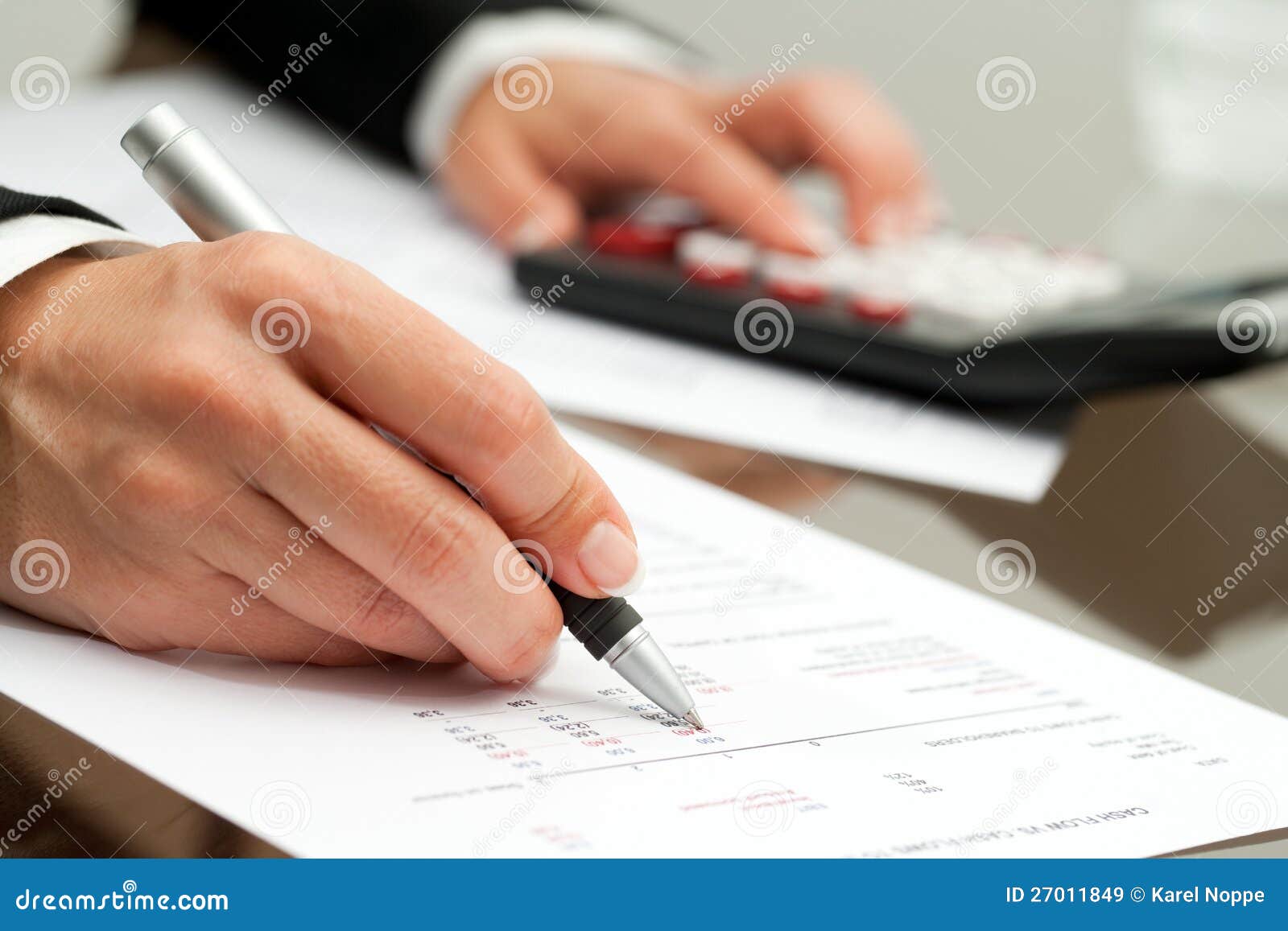 Close Up of Hand with Pen on Accounting Document. Stock Image - Image ...