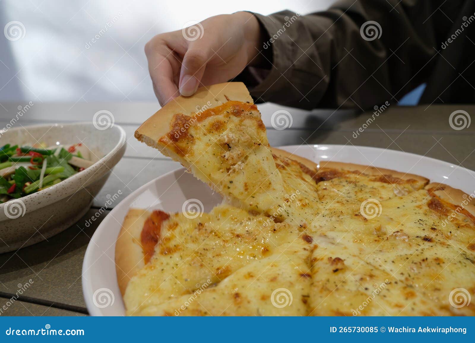 Close-up Hand Picking Pizza from Plate Stock Image - Image of ...