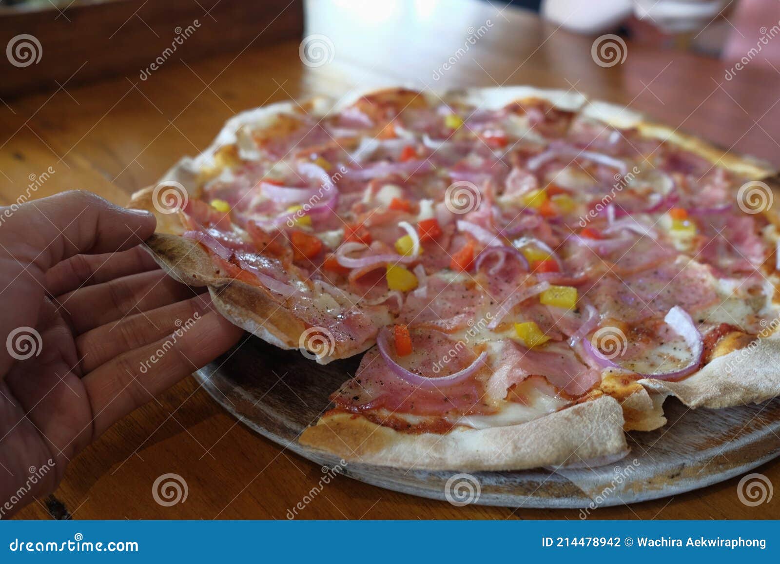 Close-up Hand Picking Up Pizza Slice from Tray Stock Photo - Image of ...