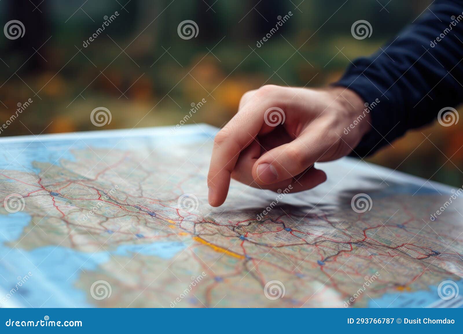 Close Up Hand is Pointing Direction To a Map on a Piece of Paper ...
