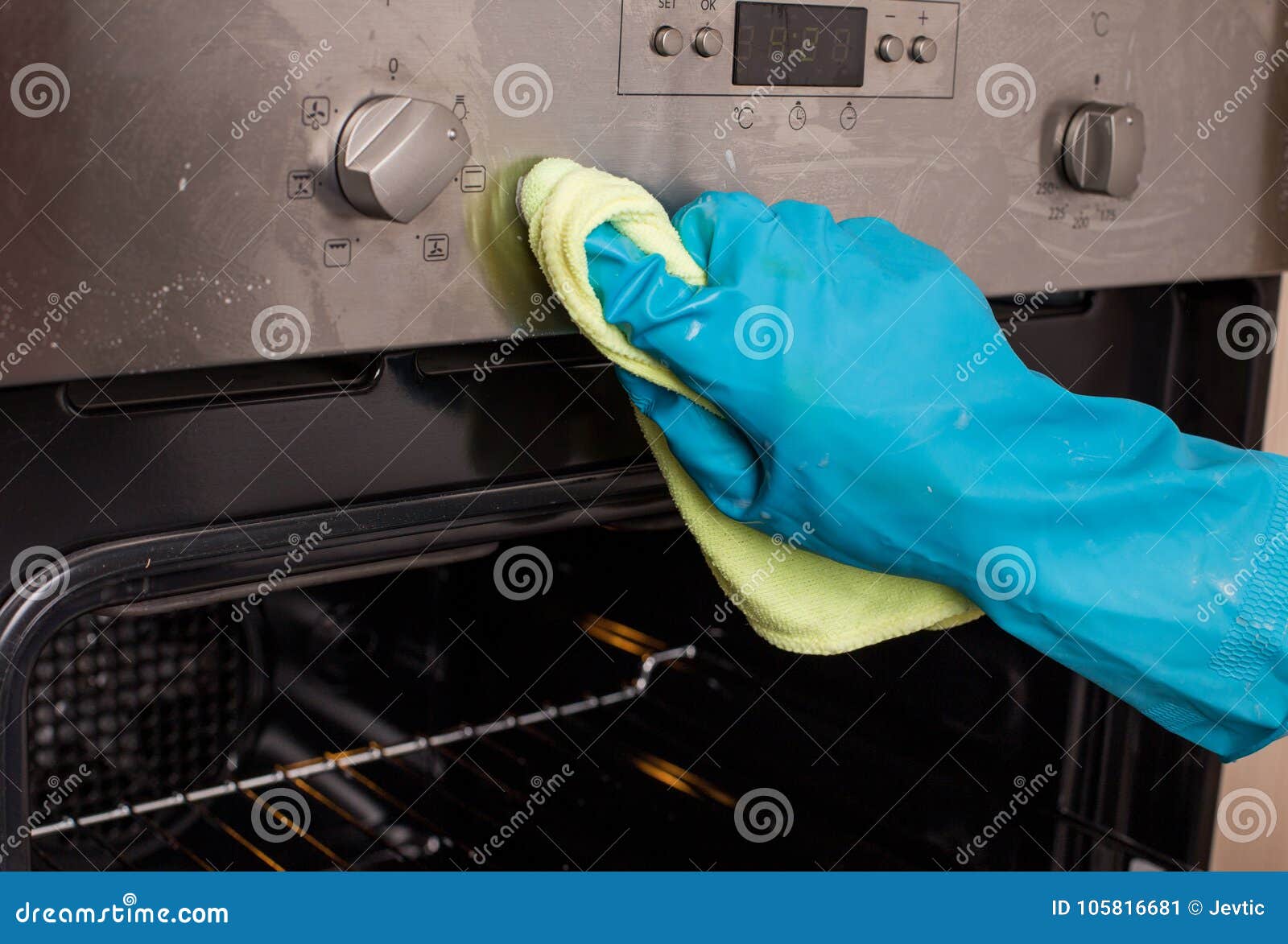 Cleaning Control Panel of Oven Stock Image - Image of detergent, knob ...