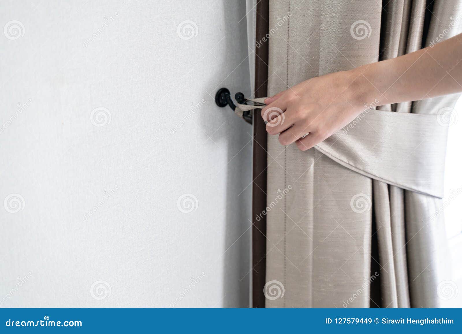 Hand Pulling Curtain Tie stock image. Image of object - 127579449