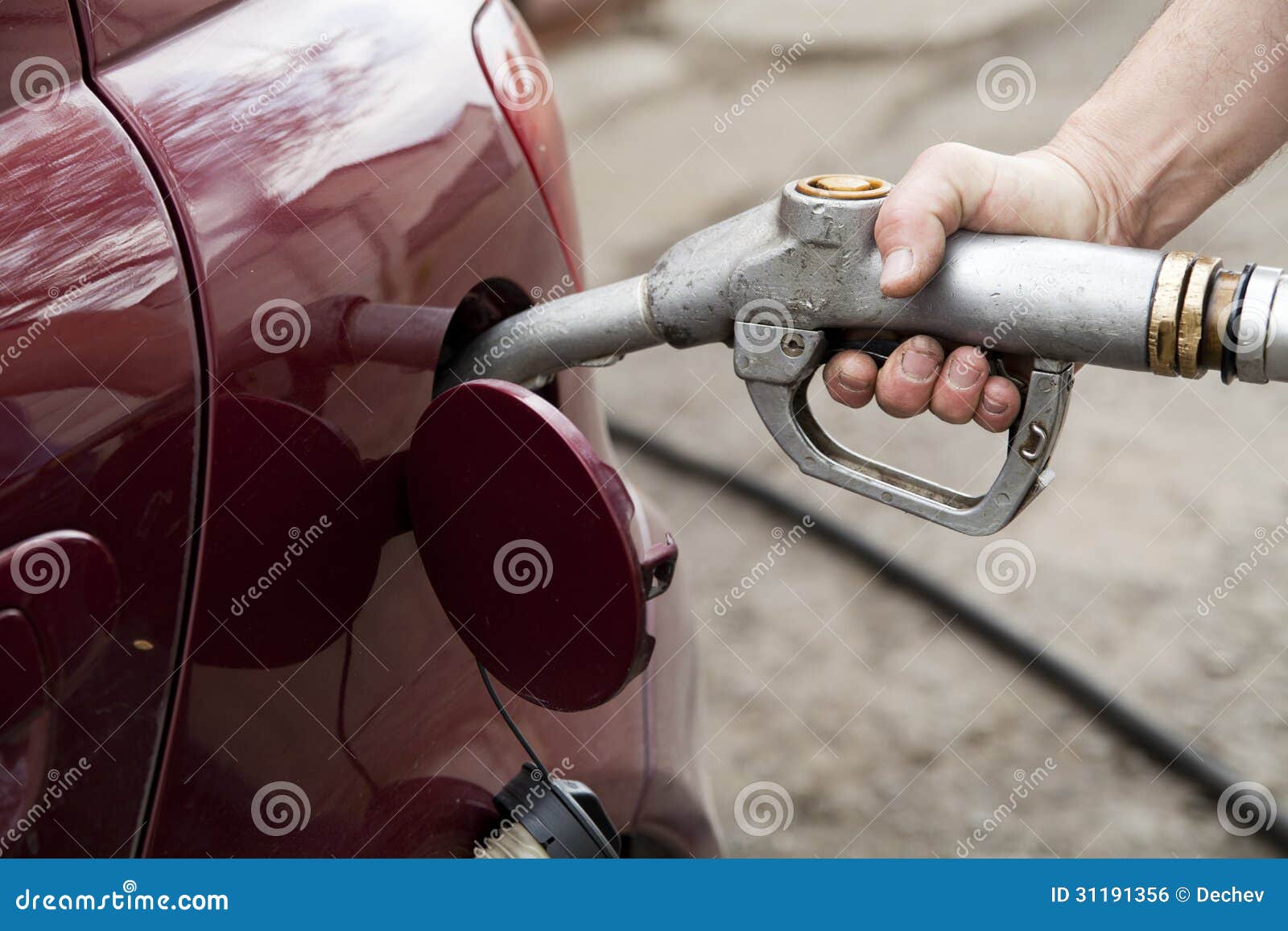 Close-up of a Hand Pumping Gas in the Car Stock Photo - Image of ...