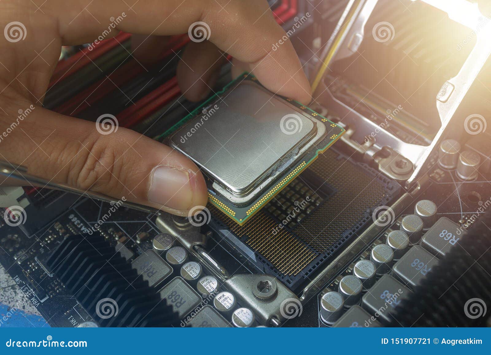 Close Up Hand of Technician Putting CPU on the Socket of Computer ...