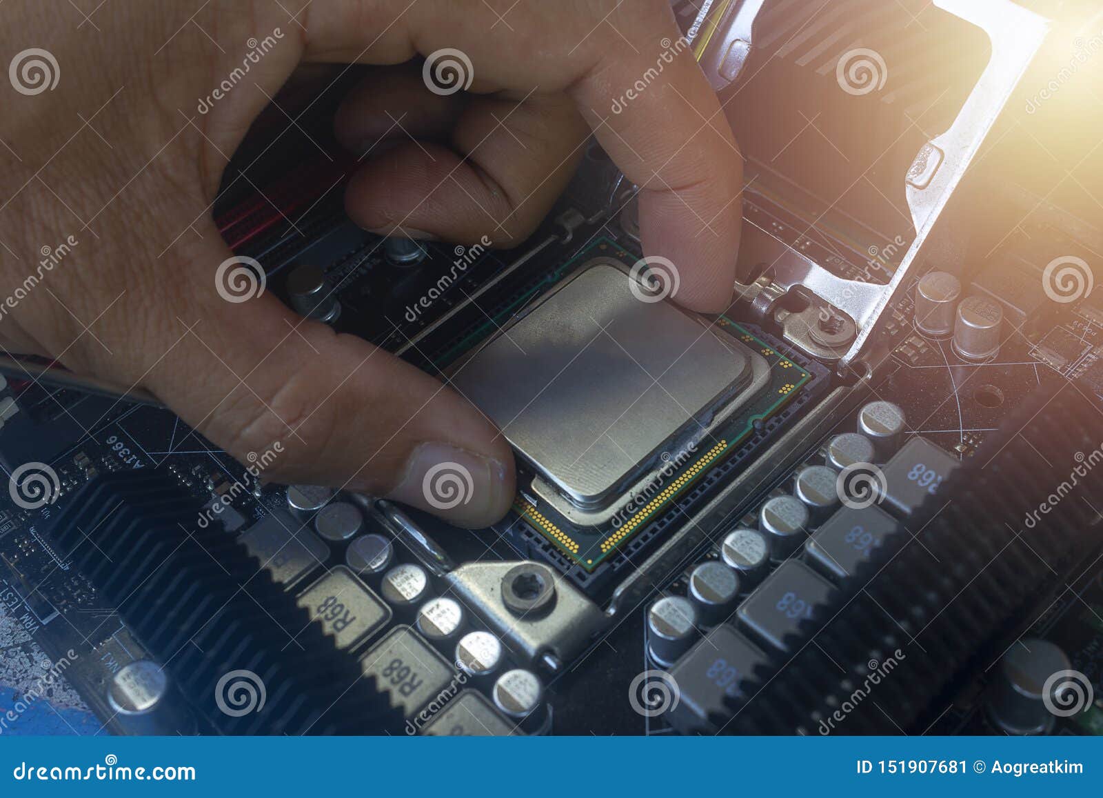 Close Up Hand of Technician Putting CPU on the Socket of Computer ...