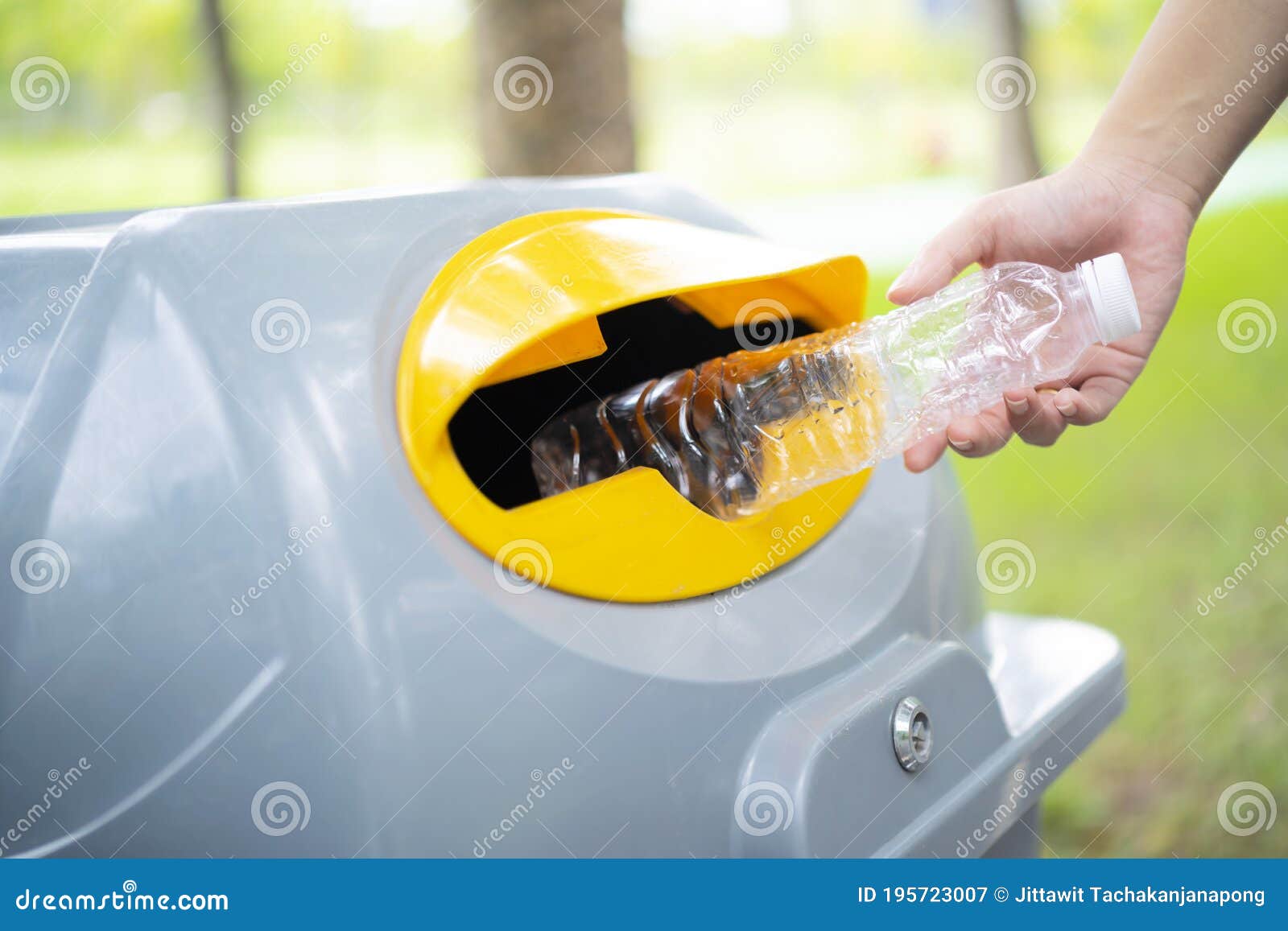 Close Up Hand Throwing Empty Plastic Bottle into the Trash Stock Image ...