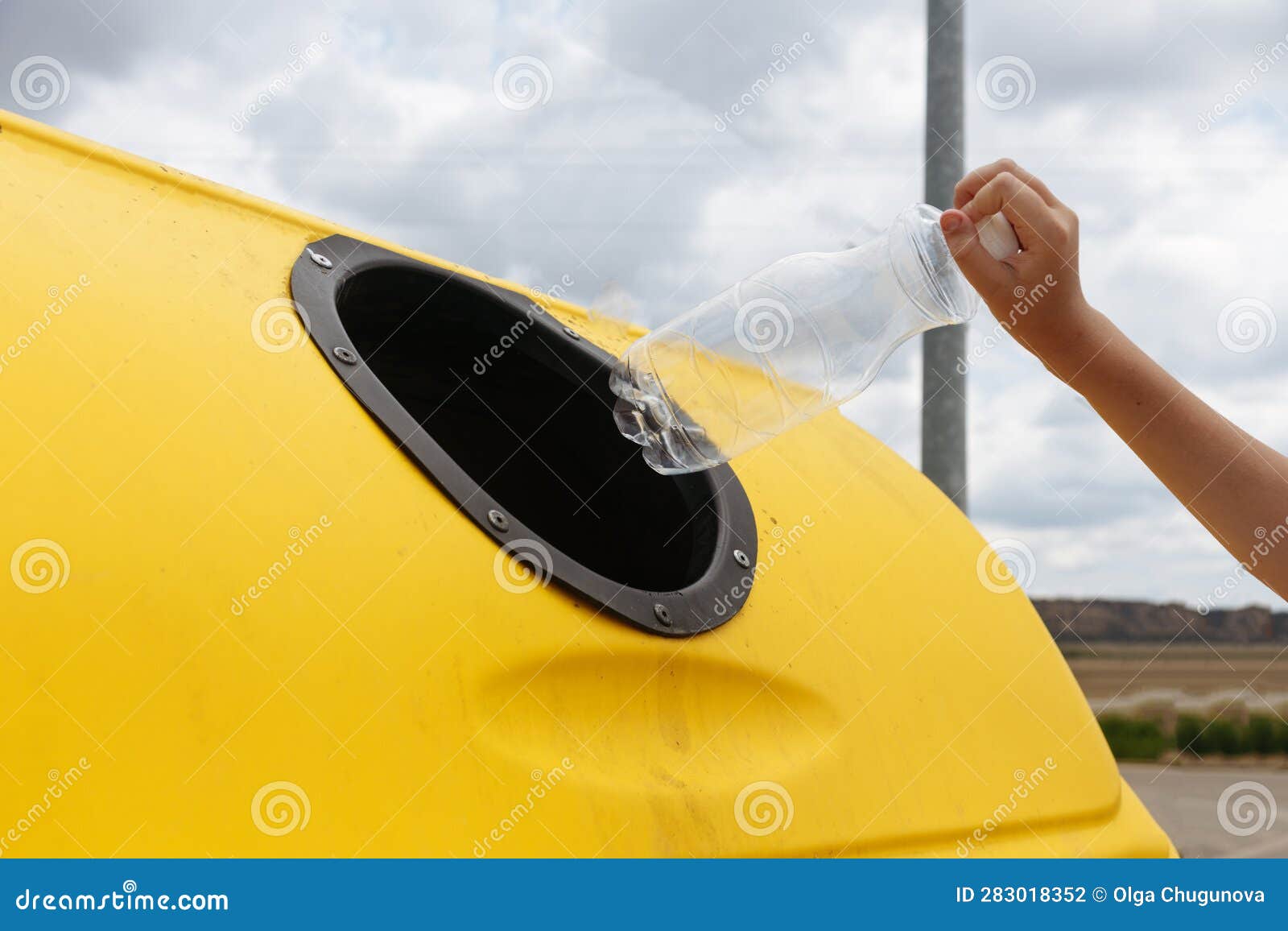 Close-up Hand Throwing Out a Plastic Bottle in a Trash Can Stock Photo ...