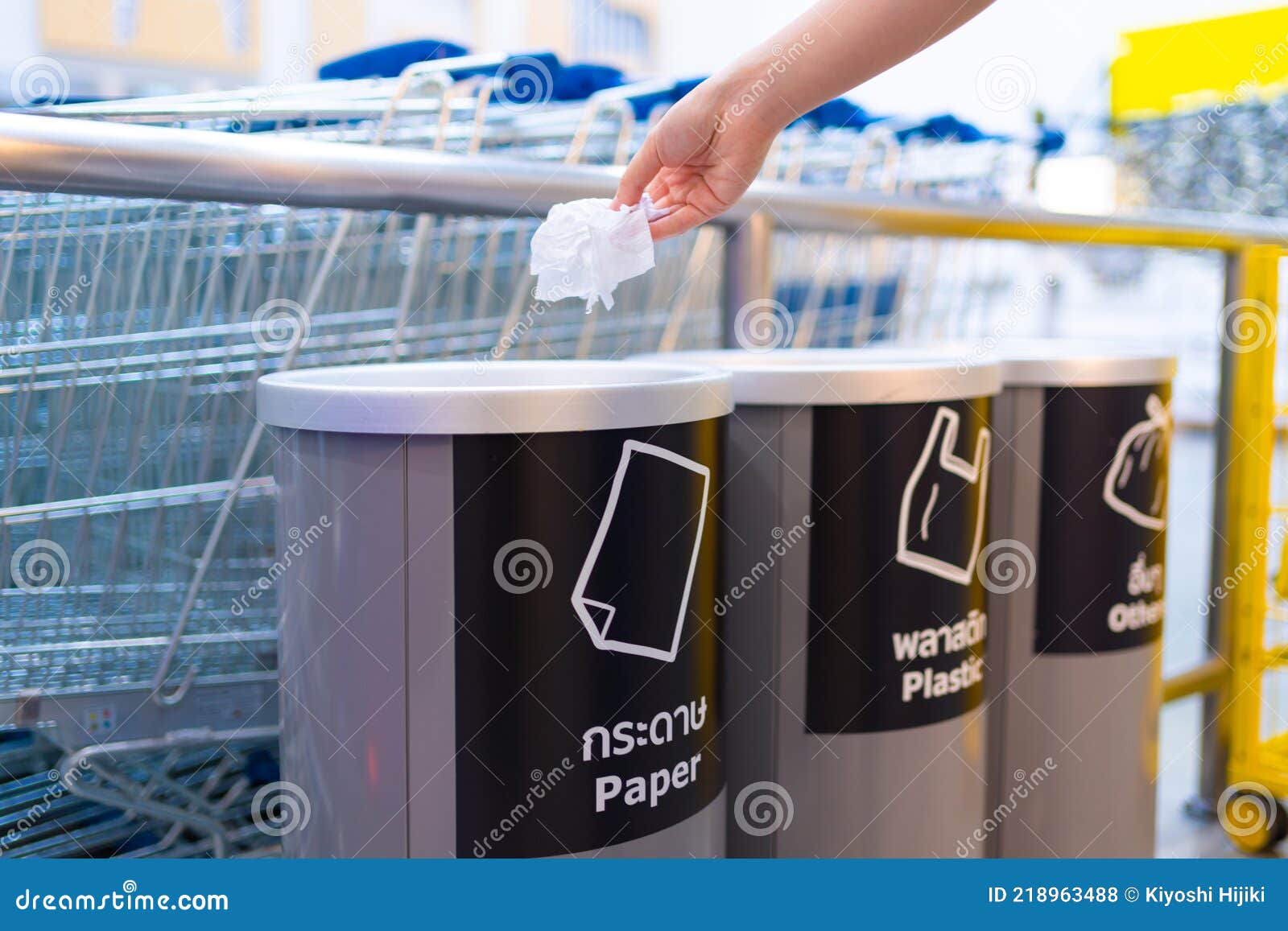 Close Up Hand Throwing a Paper into the Trash Stock Photo - Image of ...