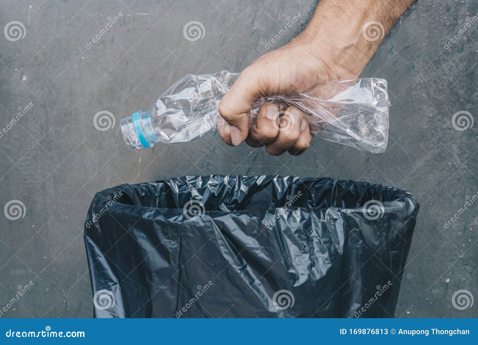 Close-up Of Man Throwing Peace Of Cardboard In Recycling Bins. Humen ...