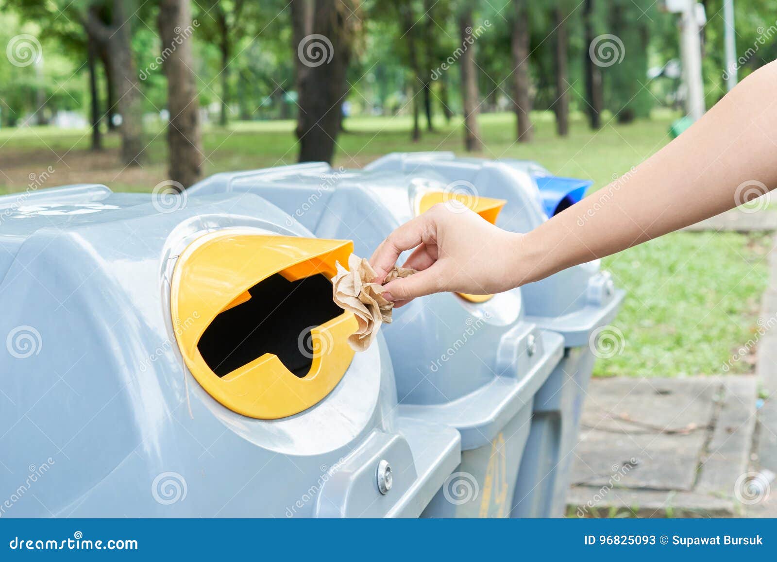 Close Up Hand Throwing Tissue Paper into Recycling Bin, Concept of ...
