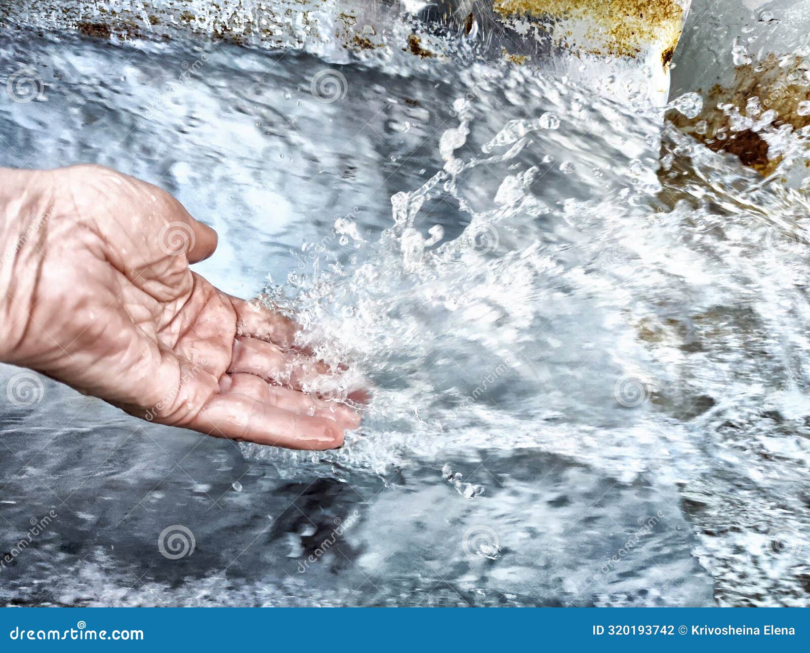 Close-Up of a Hand Touching Flowing Water. Hand Interacting with Water ...