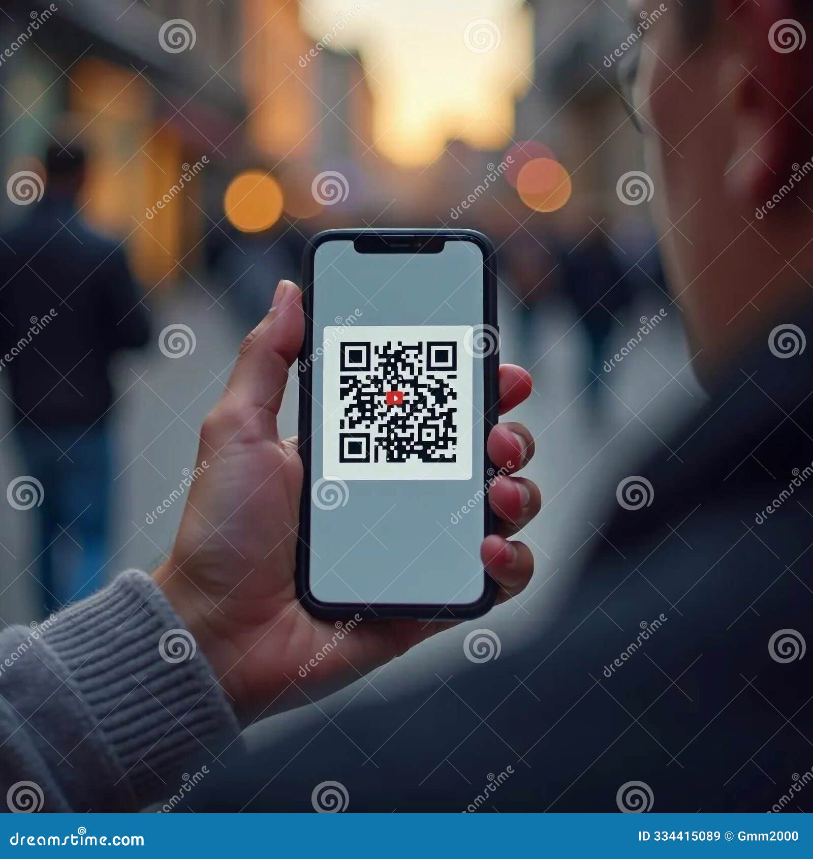 Close-up of Hand Using Phone with QR Code Screen. Blurred City ...