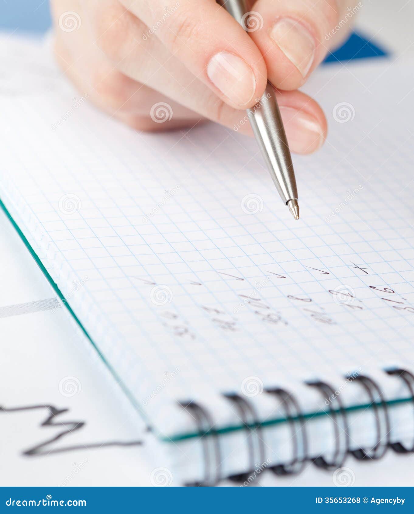Close Up of Hand Writing in the Writing Pad Stock Photo - Image of ...