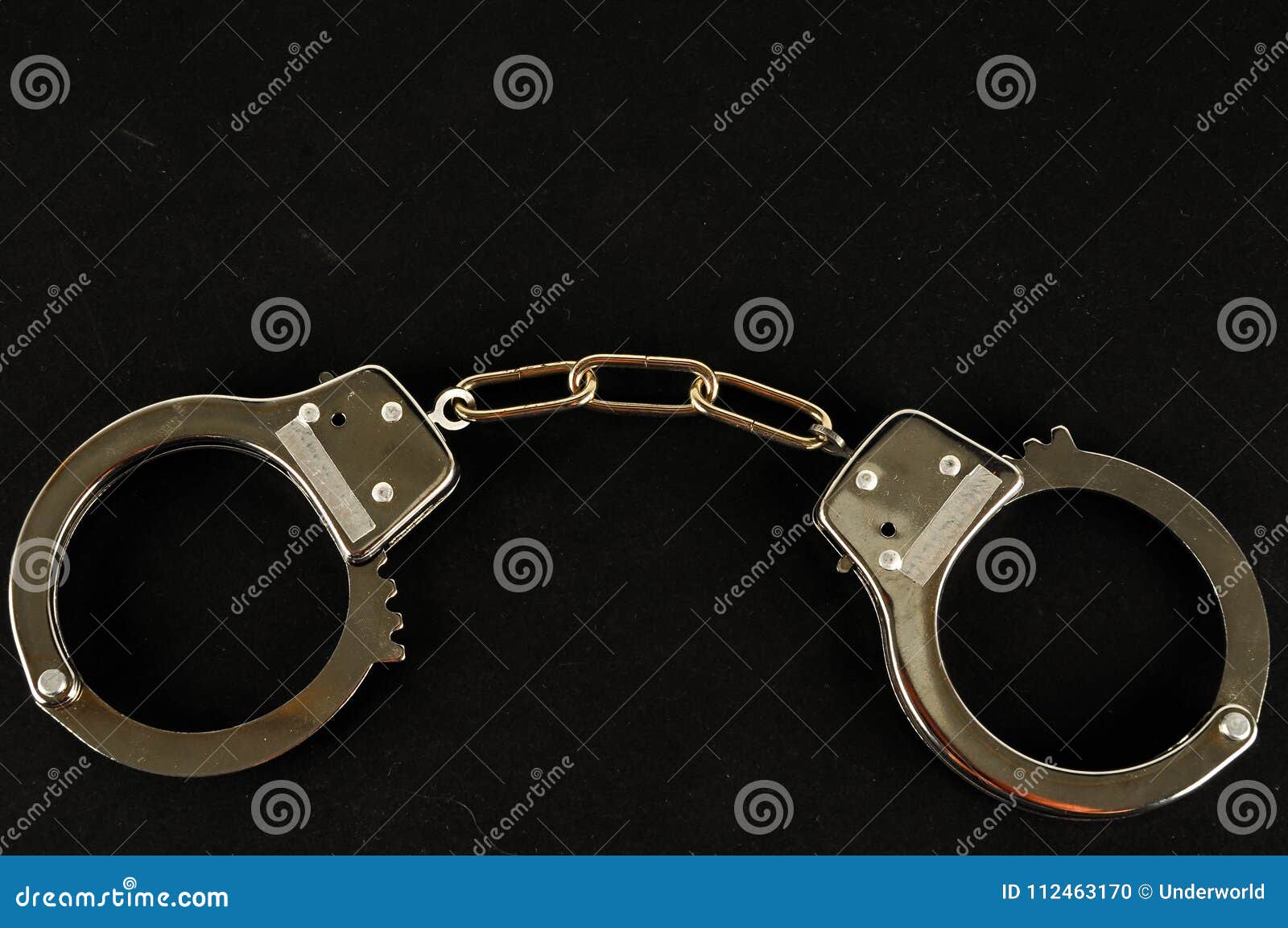 Close-up of handcuffs stock photo. Image of white, colored - 112463170