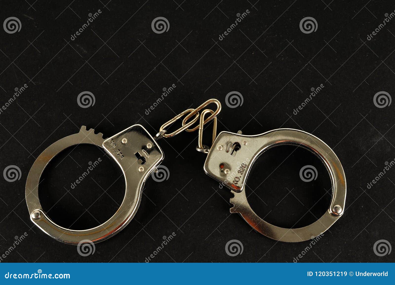 Close-up of handcuffs stock image. Image of horizontal - 120351219