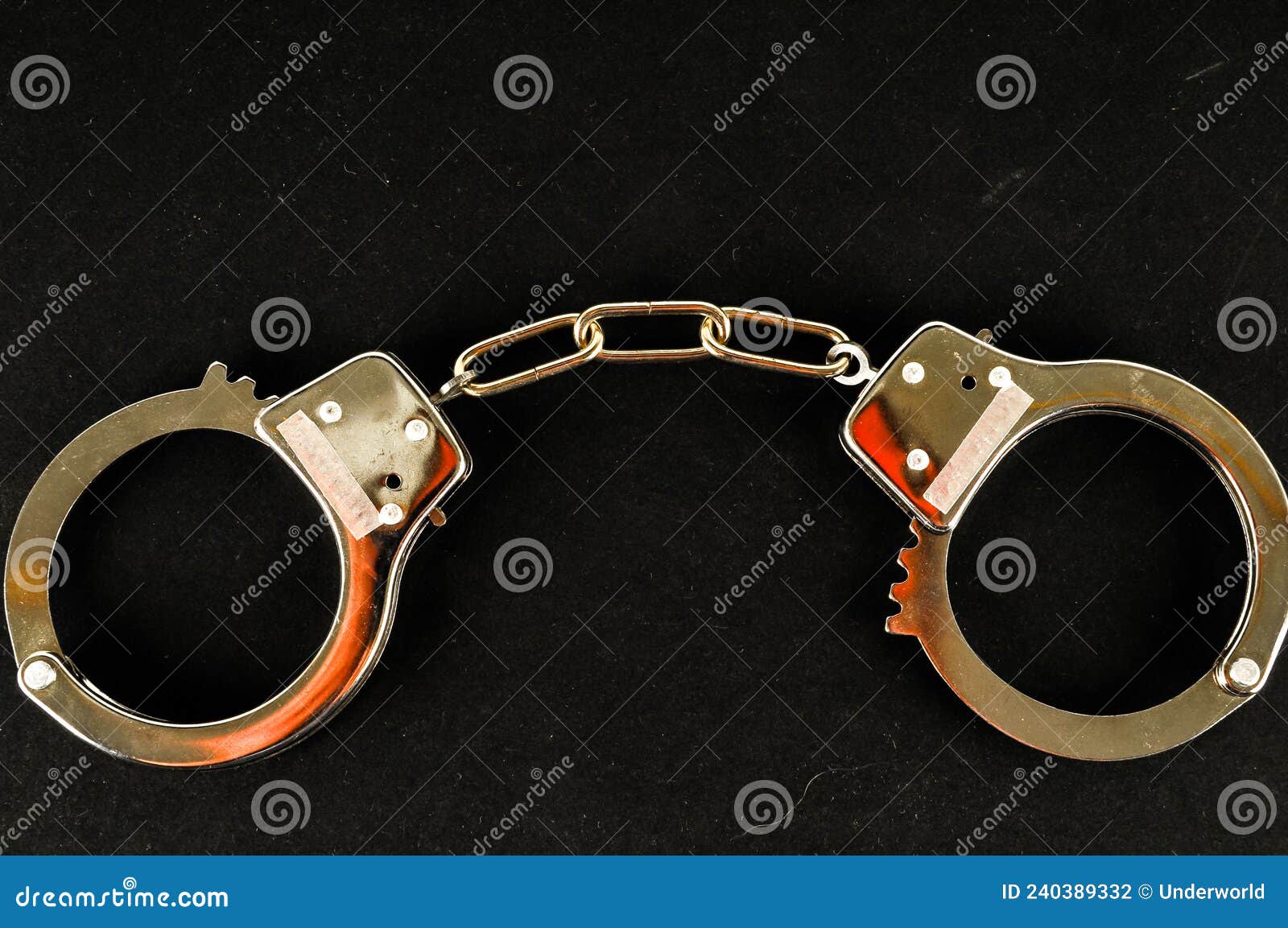 Close-up of handcuffs stock photo. Image of closeup - 240389332
