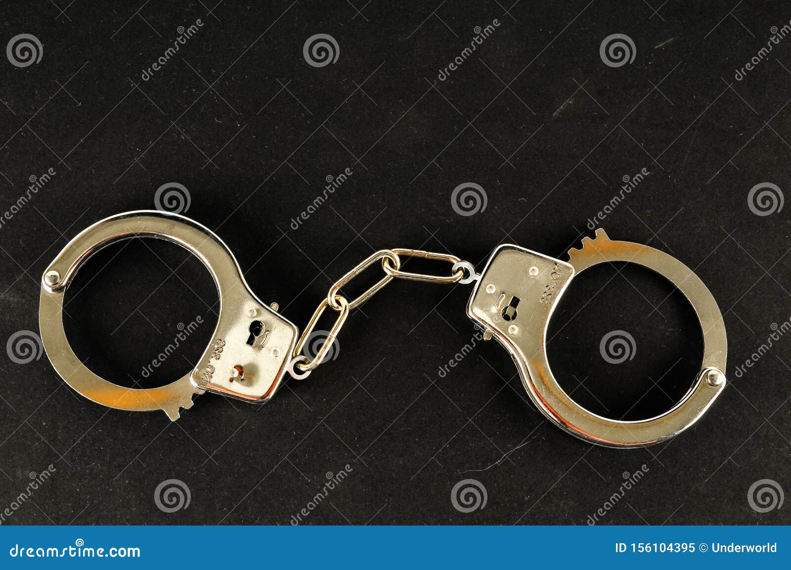 Close-up of handcuffs stock image. Image of color, single - 156104395