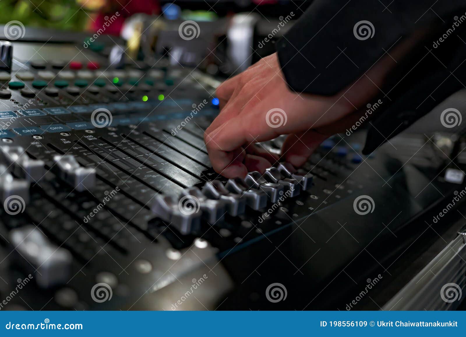 Close-up of Hands Adjusting Sound on Music Controller. Sound Music ...