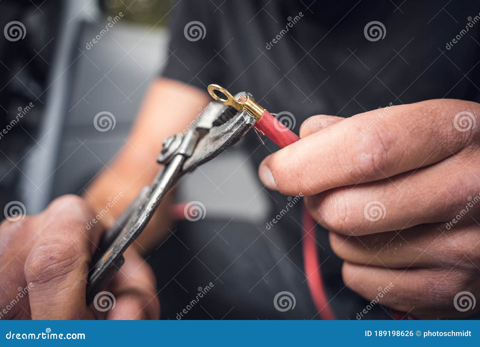 Close Up of Hands Attaching a Cable Lug To a Copper Cable Stock Photo ...