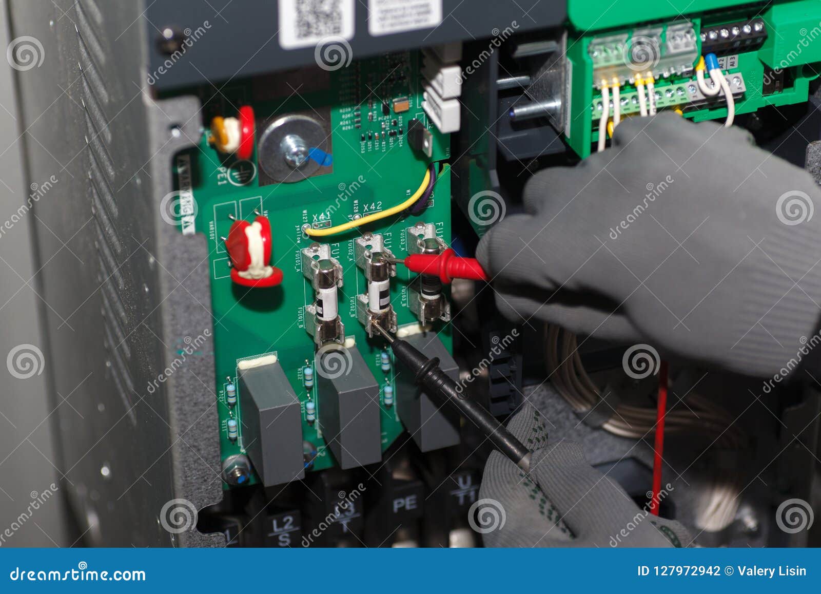 Close-up of Hands Electric Fuse Testing Stock Photo - Image of cable ...