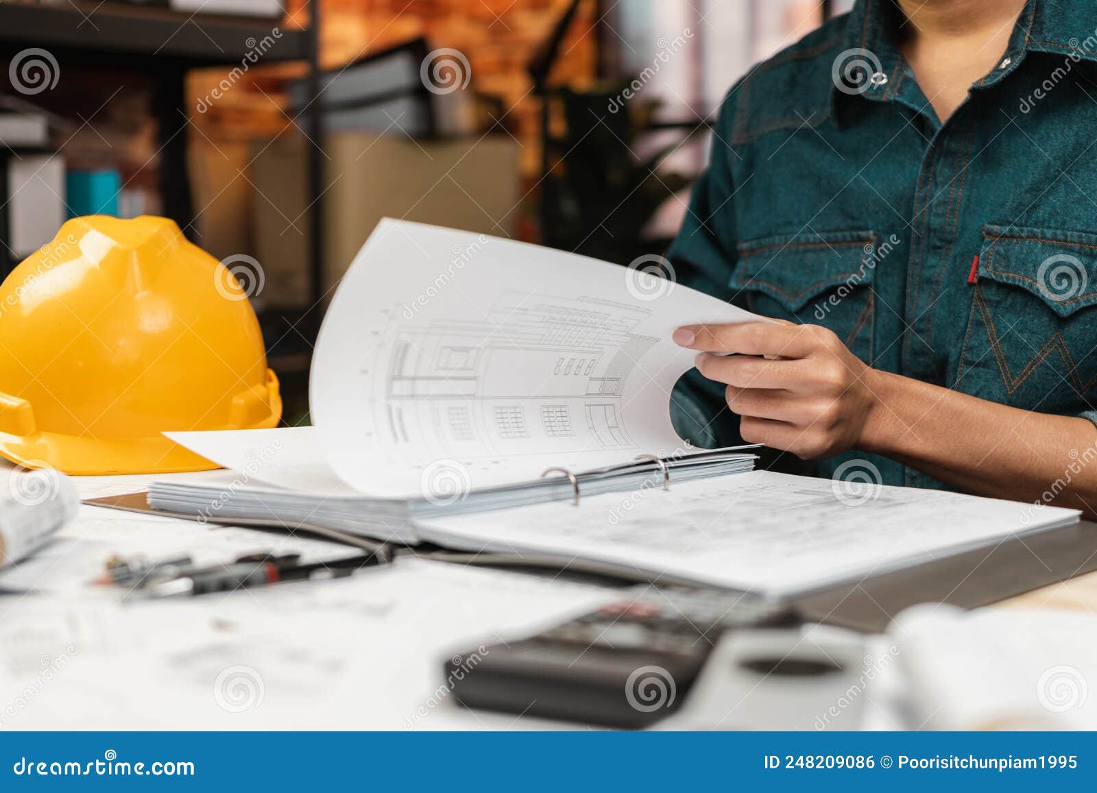 Close Up Hands of an Engineer Reading and Checking on Blueprints Paper ...