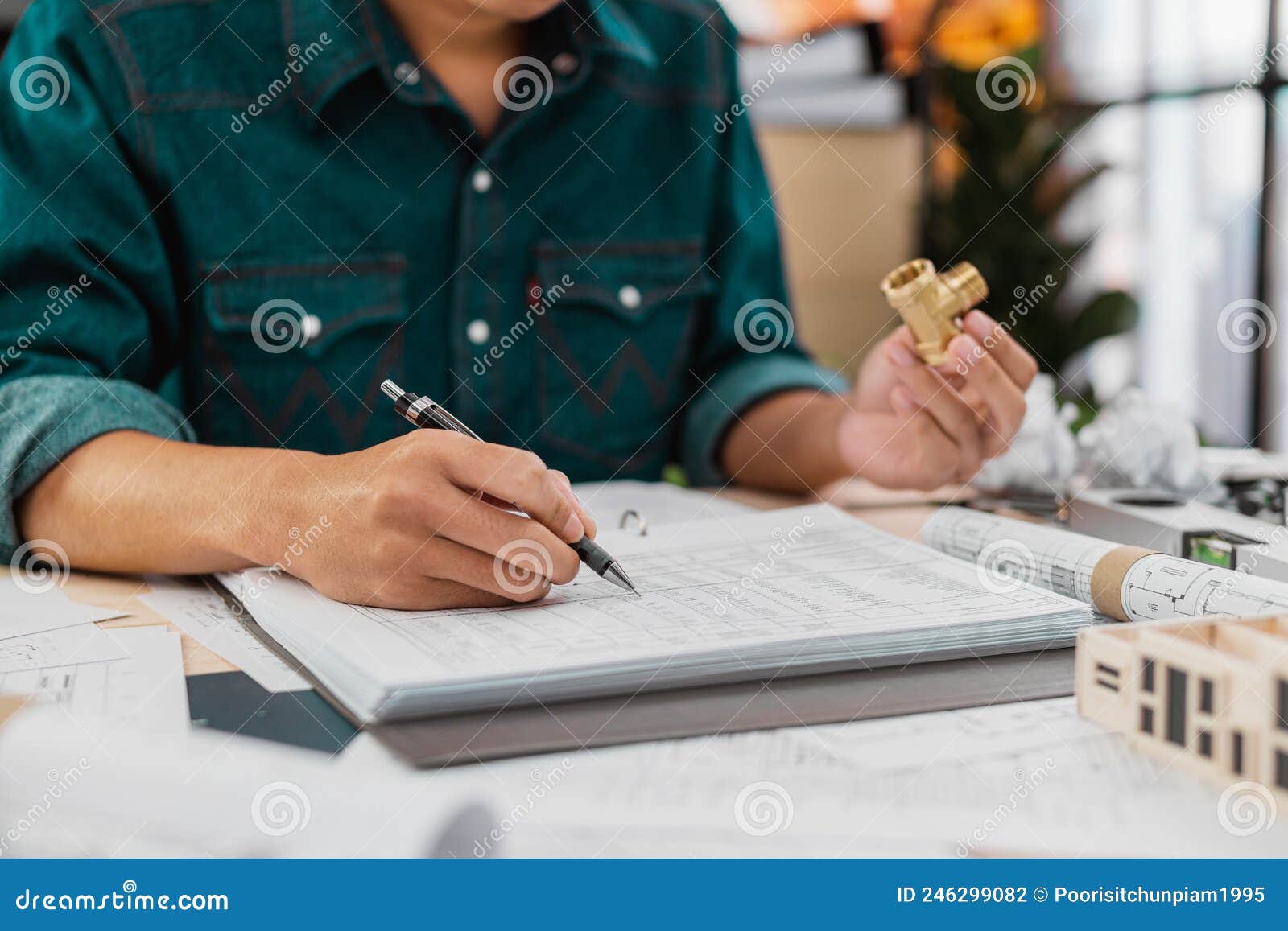 Close Up Hands of an Engineer Working and Checking on Blueprints ...