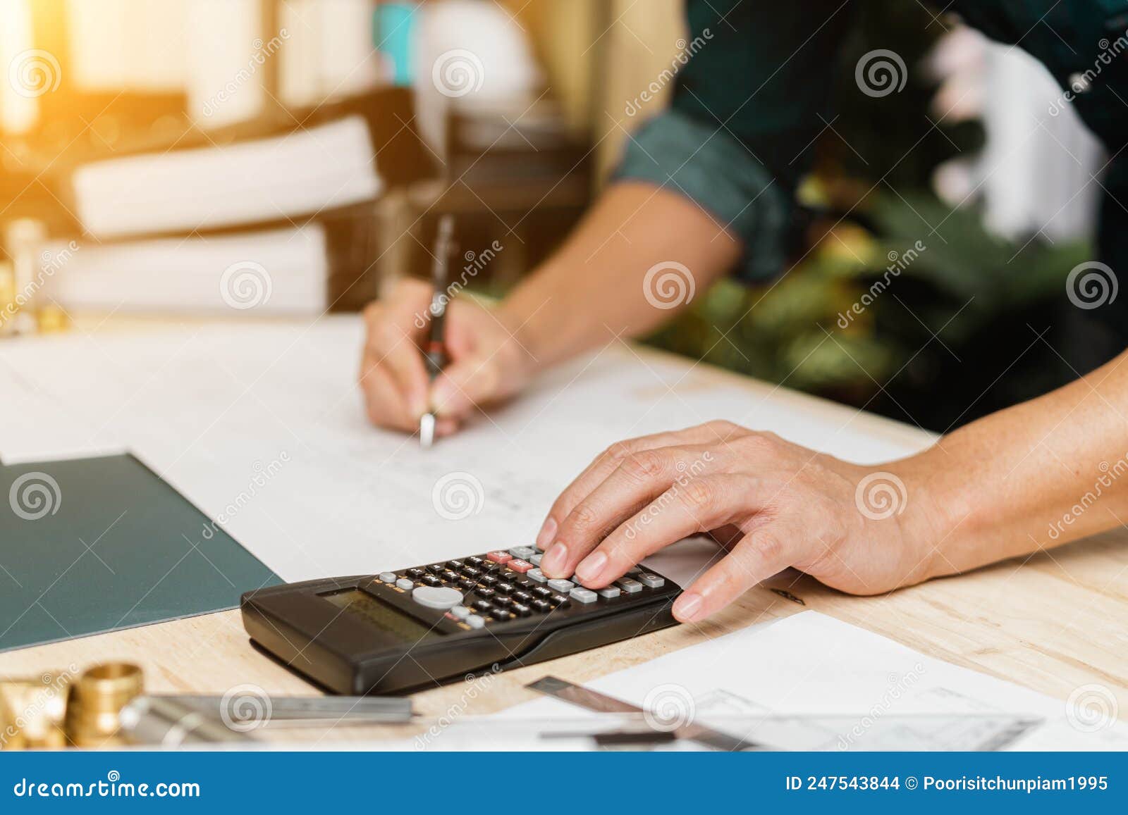Close Up Hands of an Engineer Working and Checking on Blueprints with ...