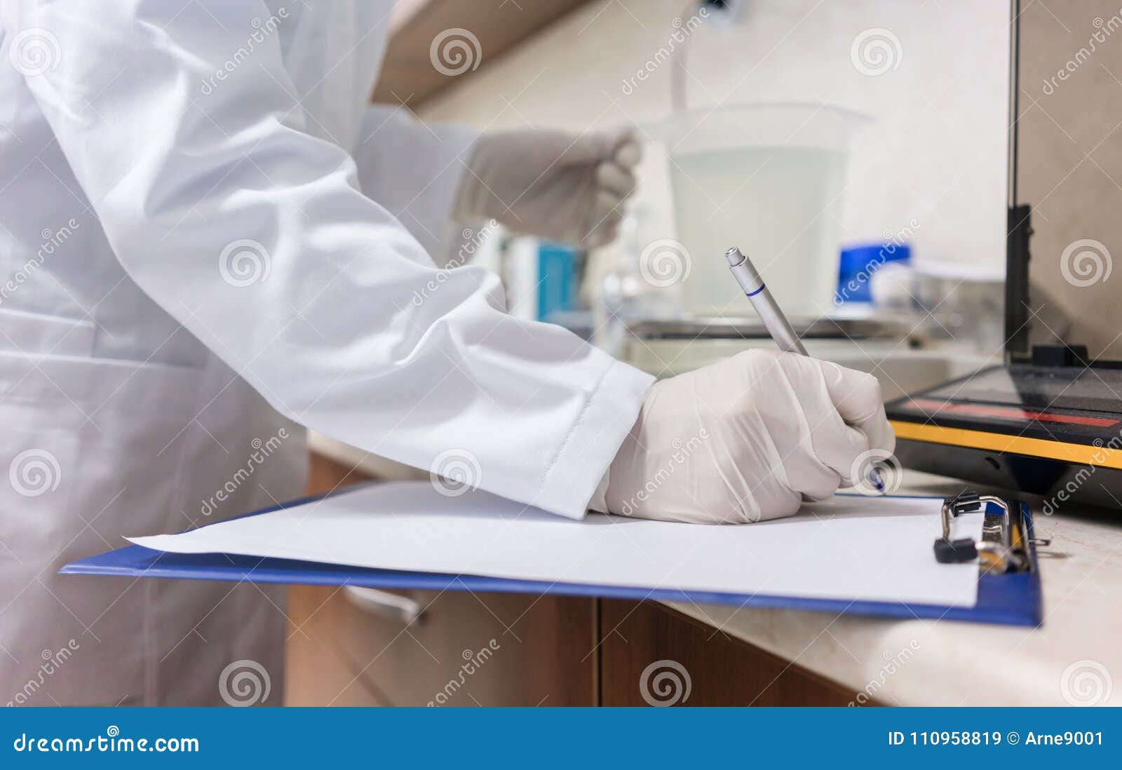 Close-up of the Hands of an Expert Analyzing Sample in the Laboratory ...